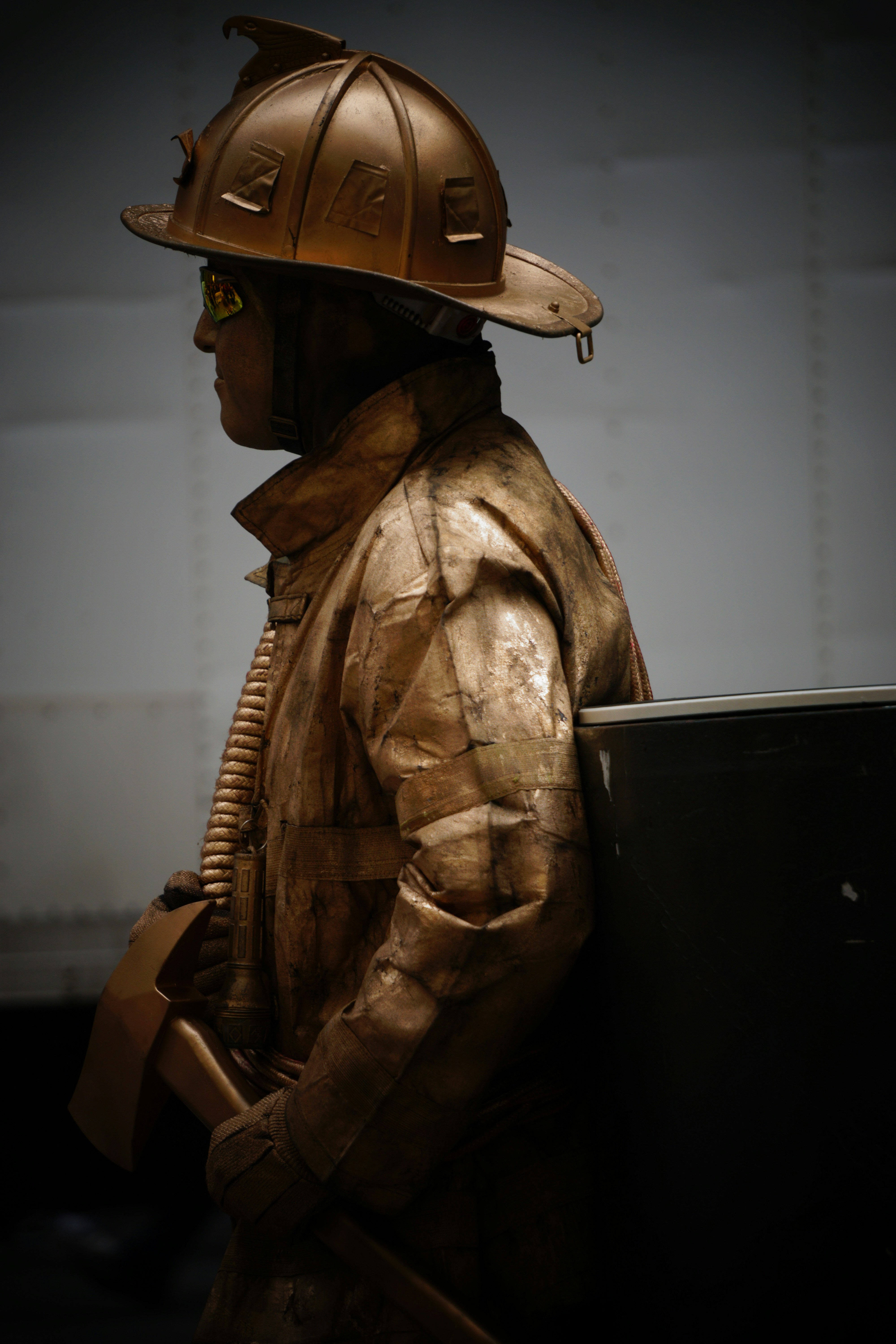Melted Bronze Sentinel: A Firefighter in Reflection