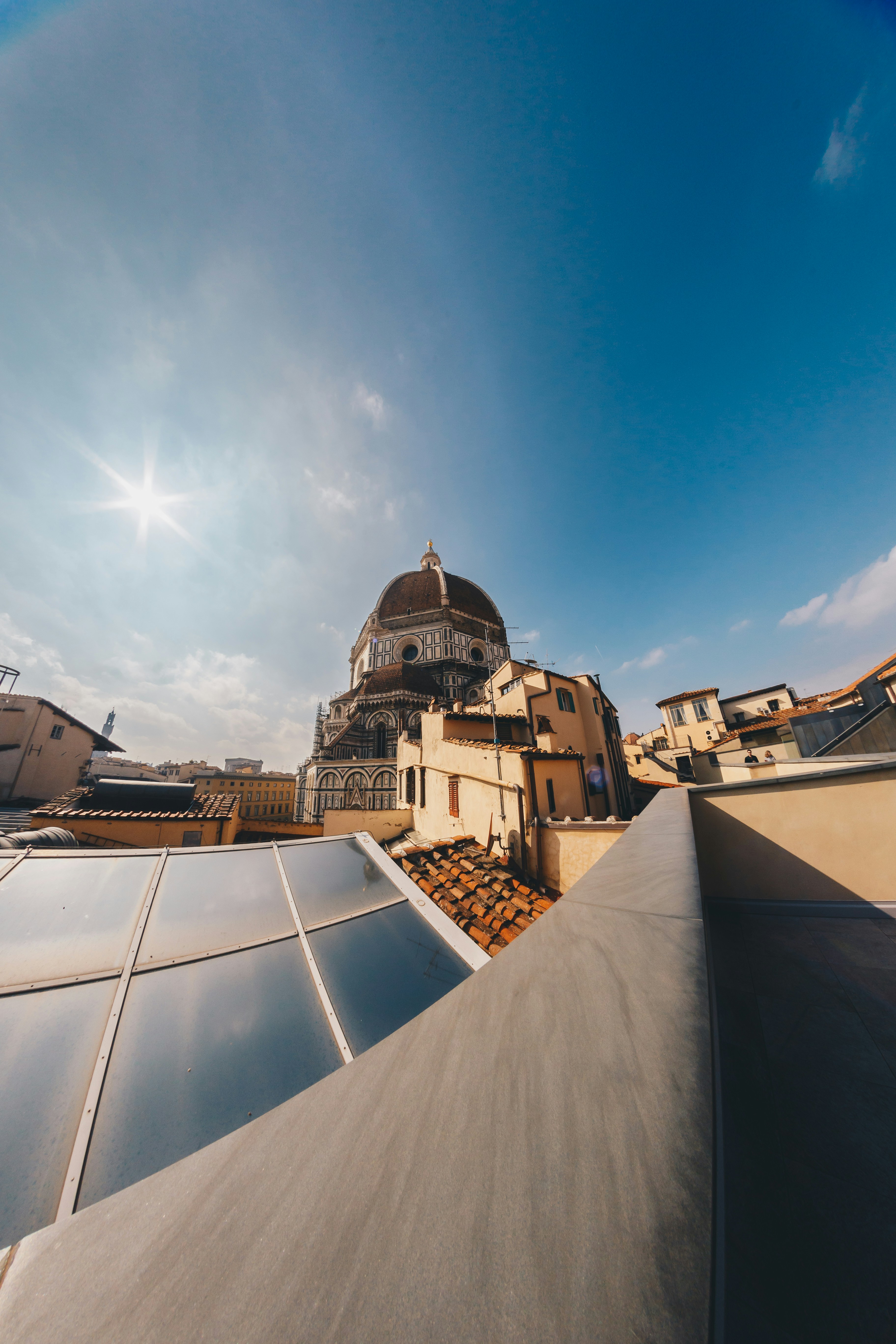 Domed Cathedral Rising Above Sunlit Rooftops