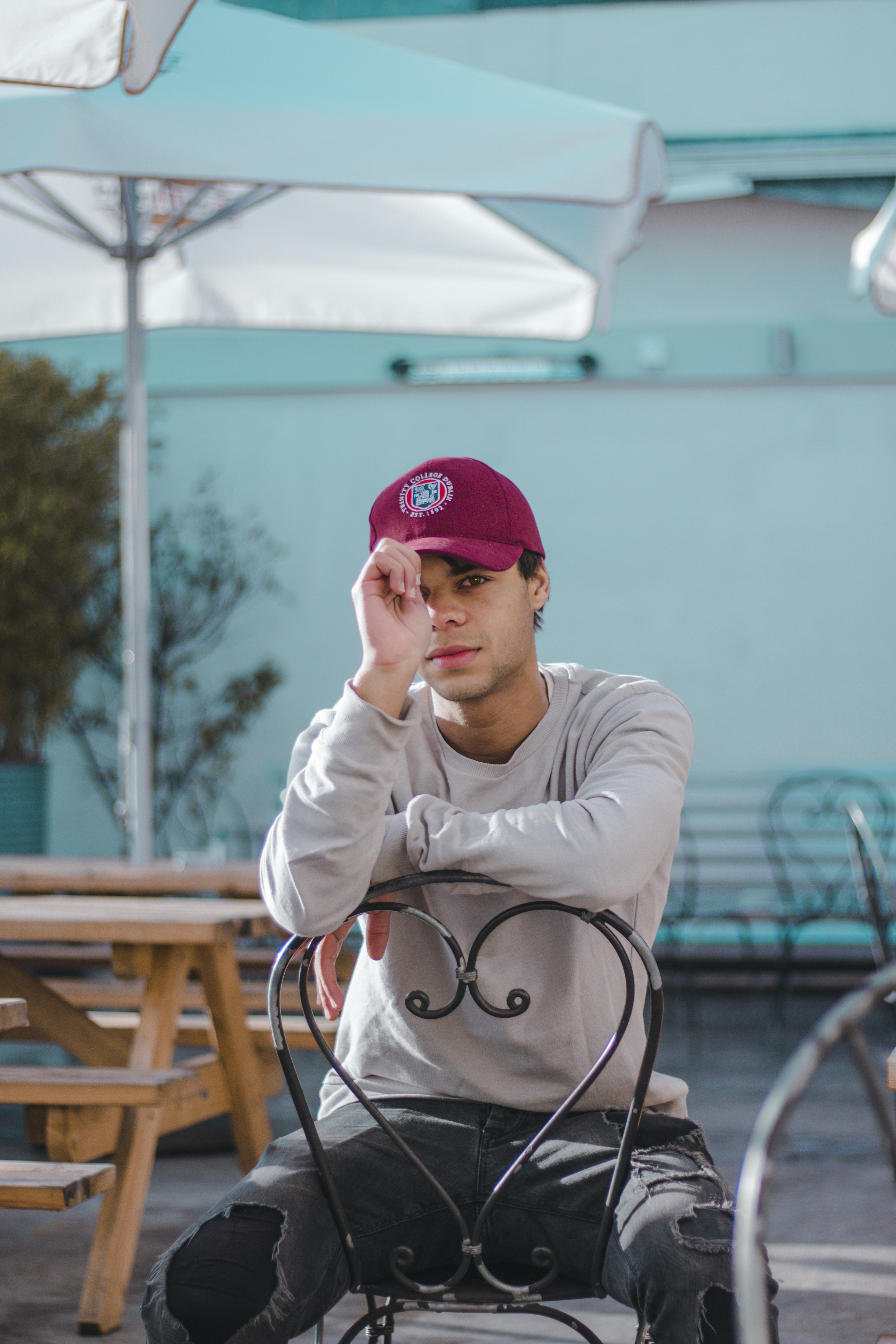 Man holding his cap photo – Free Lifestyle Image on Unsplash