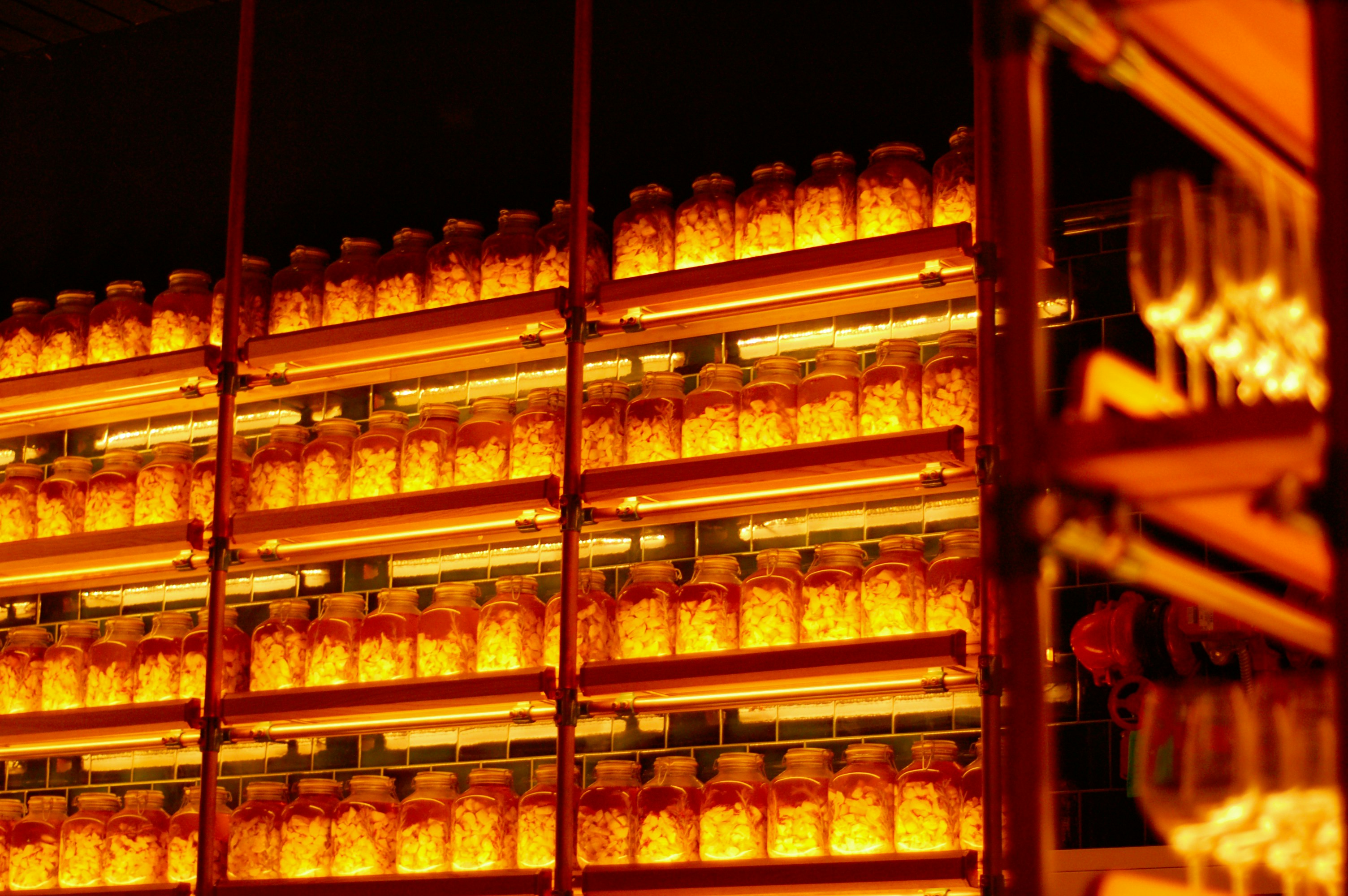 Glowing Stacks: Slices of Light in a Glass-jar Corridor