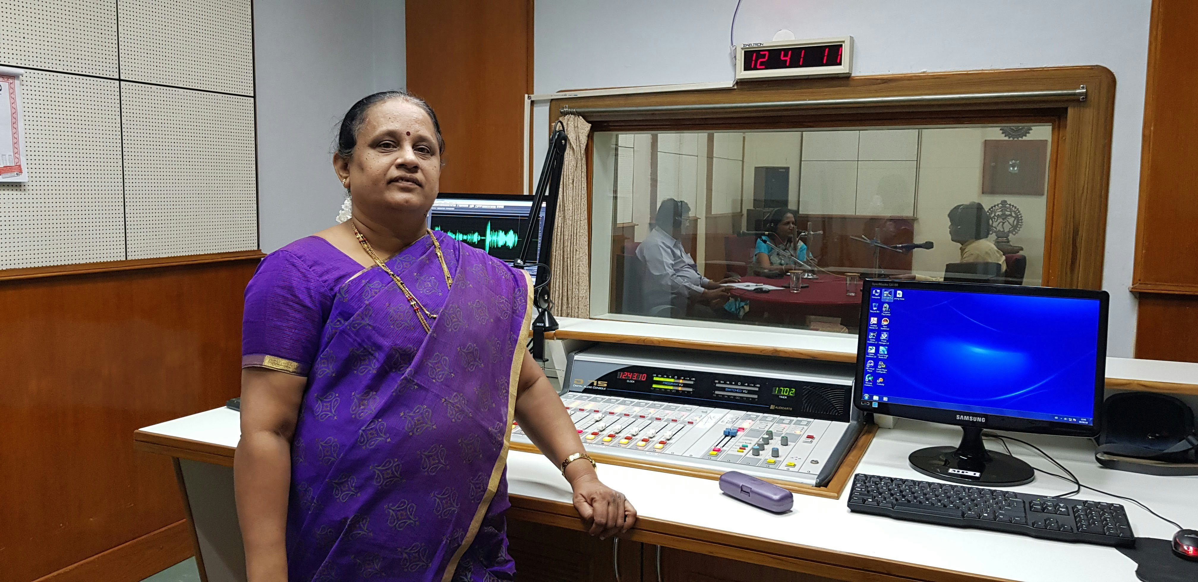 Woman standing near flat screen monitor inside room photo – Free India ...
