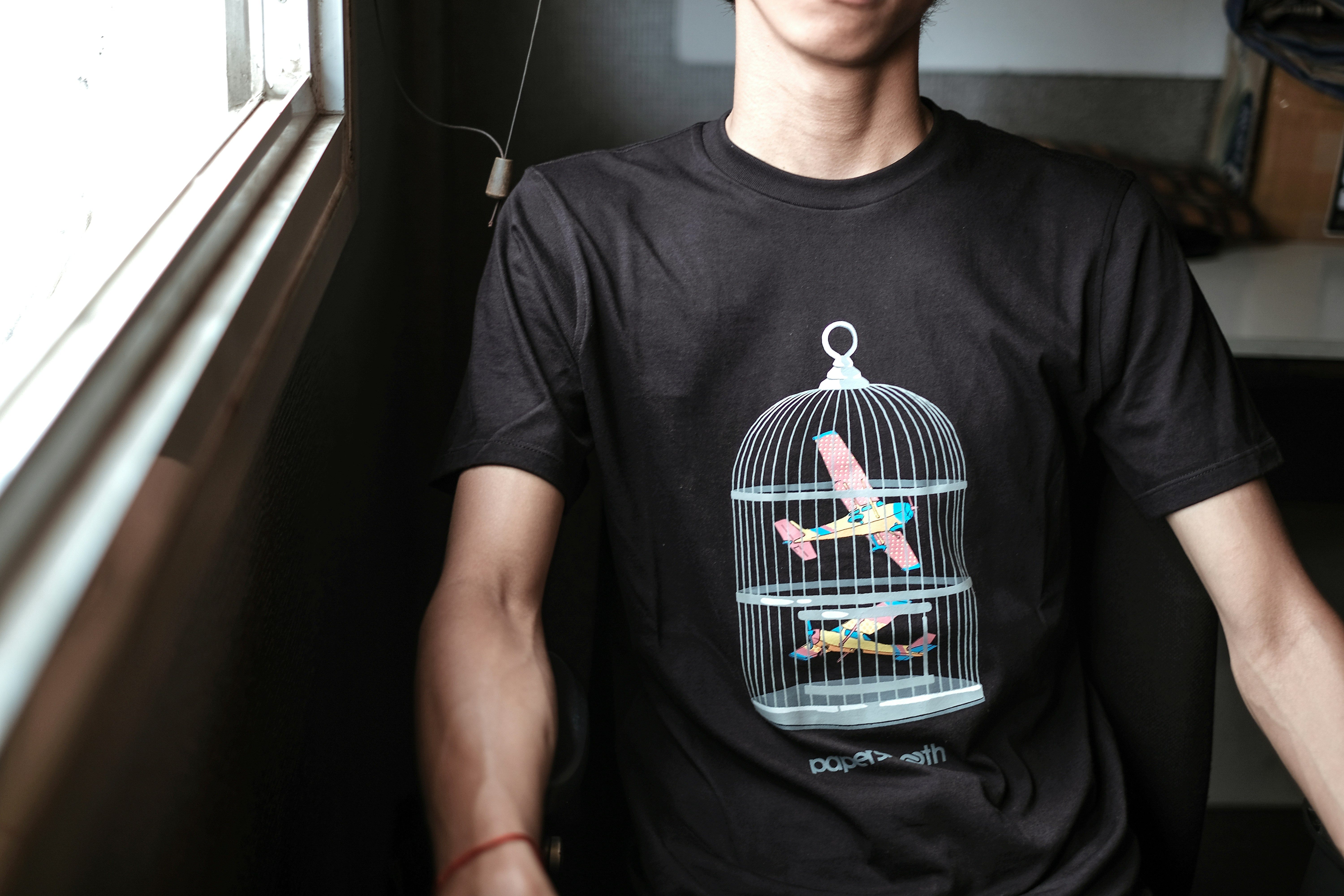 Birdcage of Color: A T-shirt Tale in a Quiet Studio