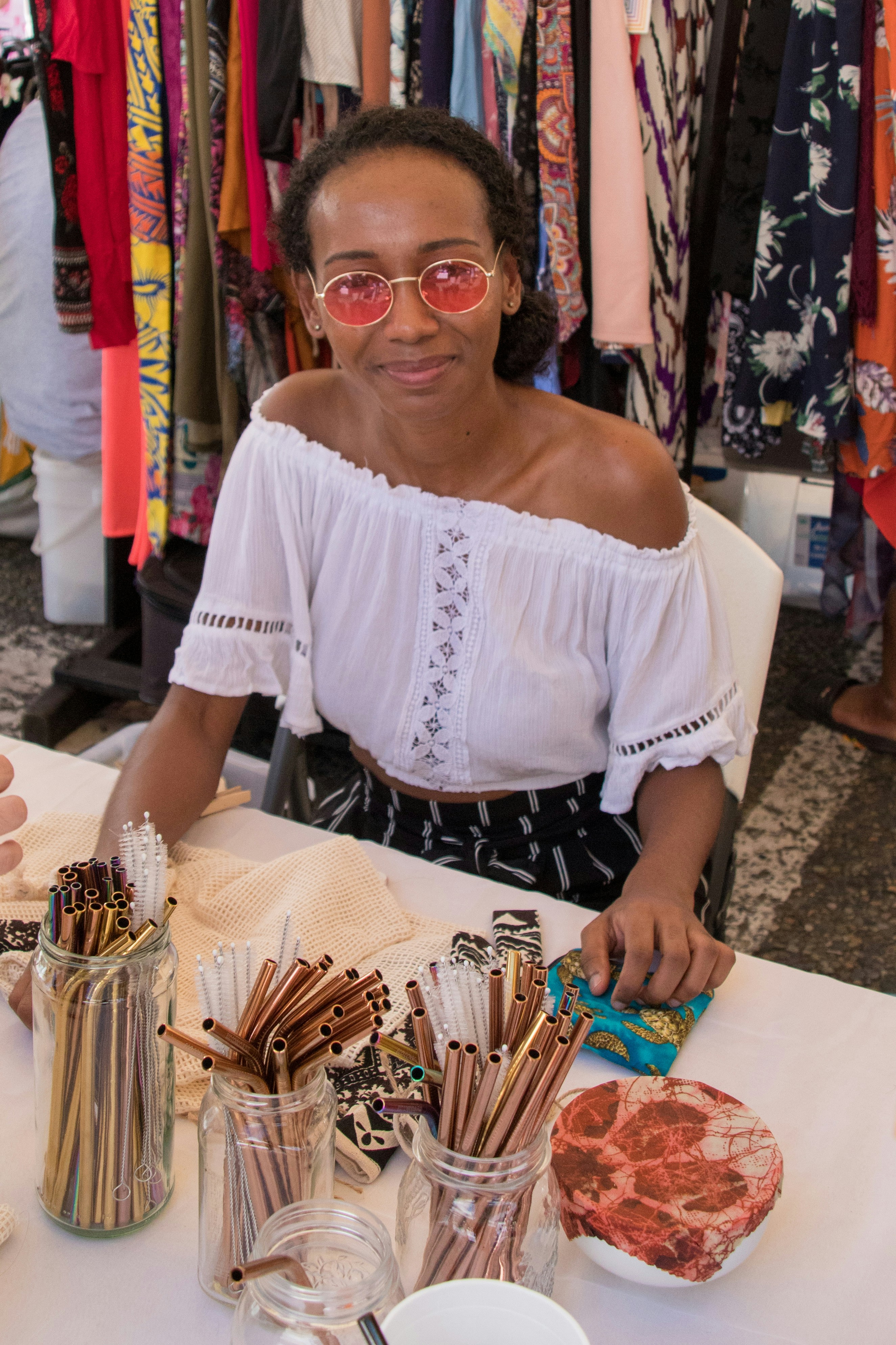 Bright-eyed Vendor in Colorful Market Attire