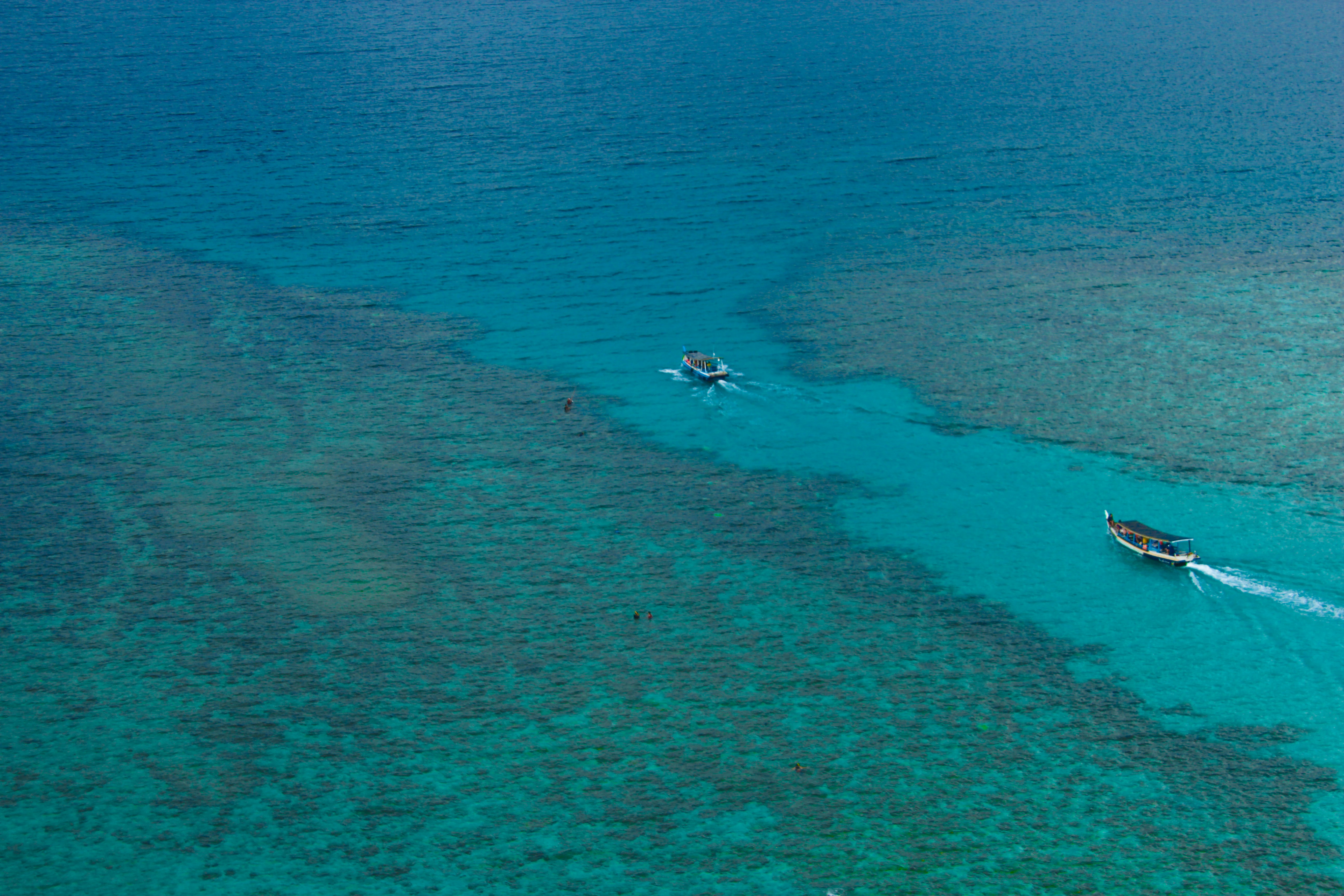 Two motorboats photo – Free Blue Image on Unsplash
