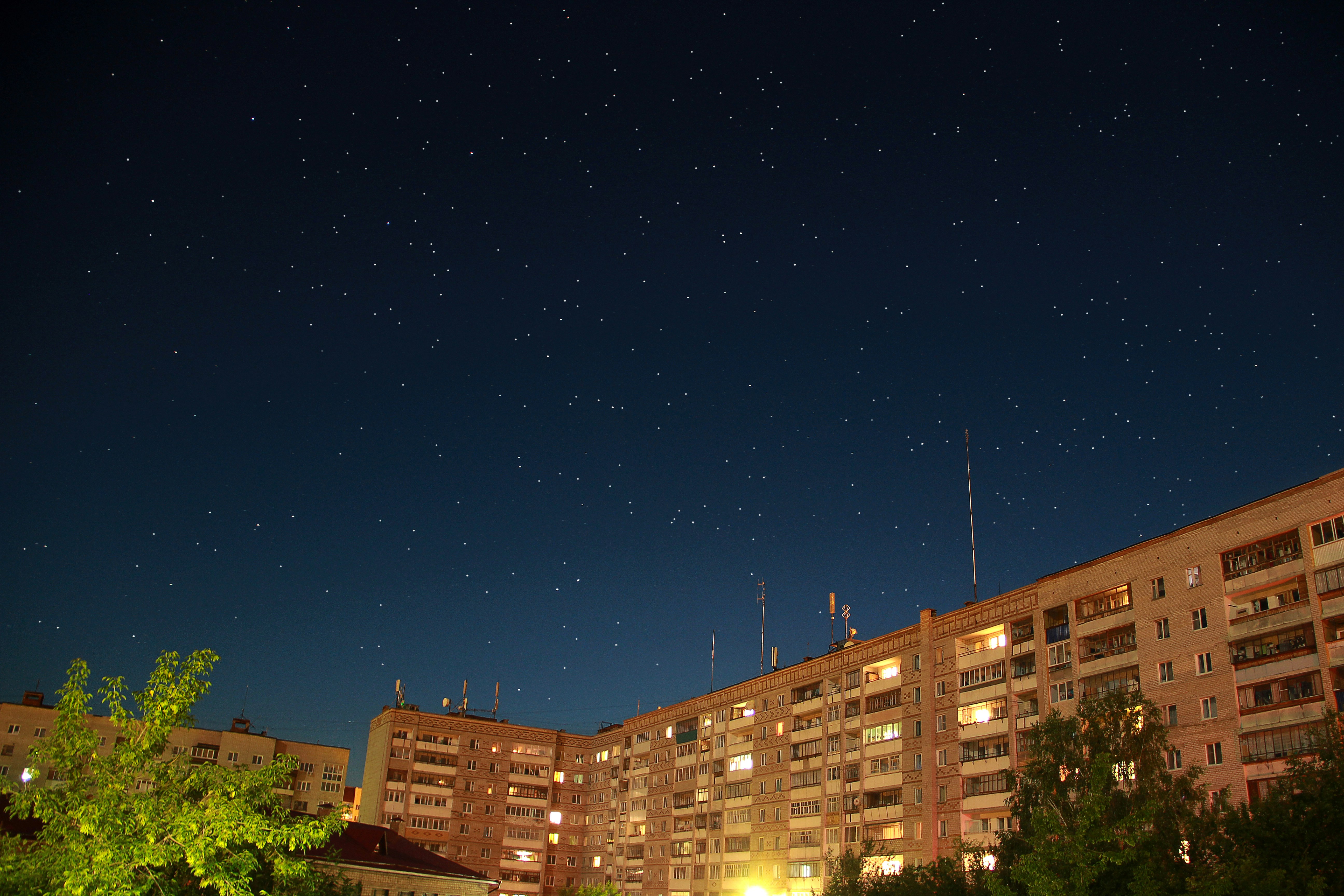 Well lighted building under starry night at nighttime photo – Free ...