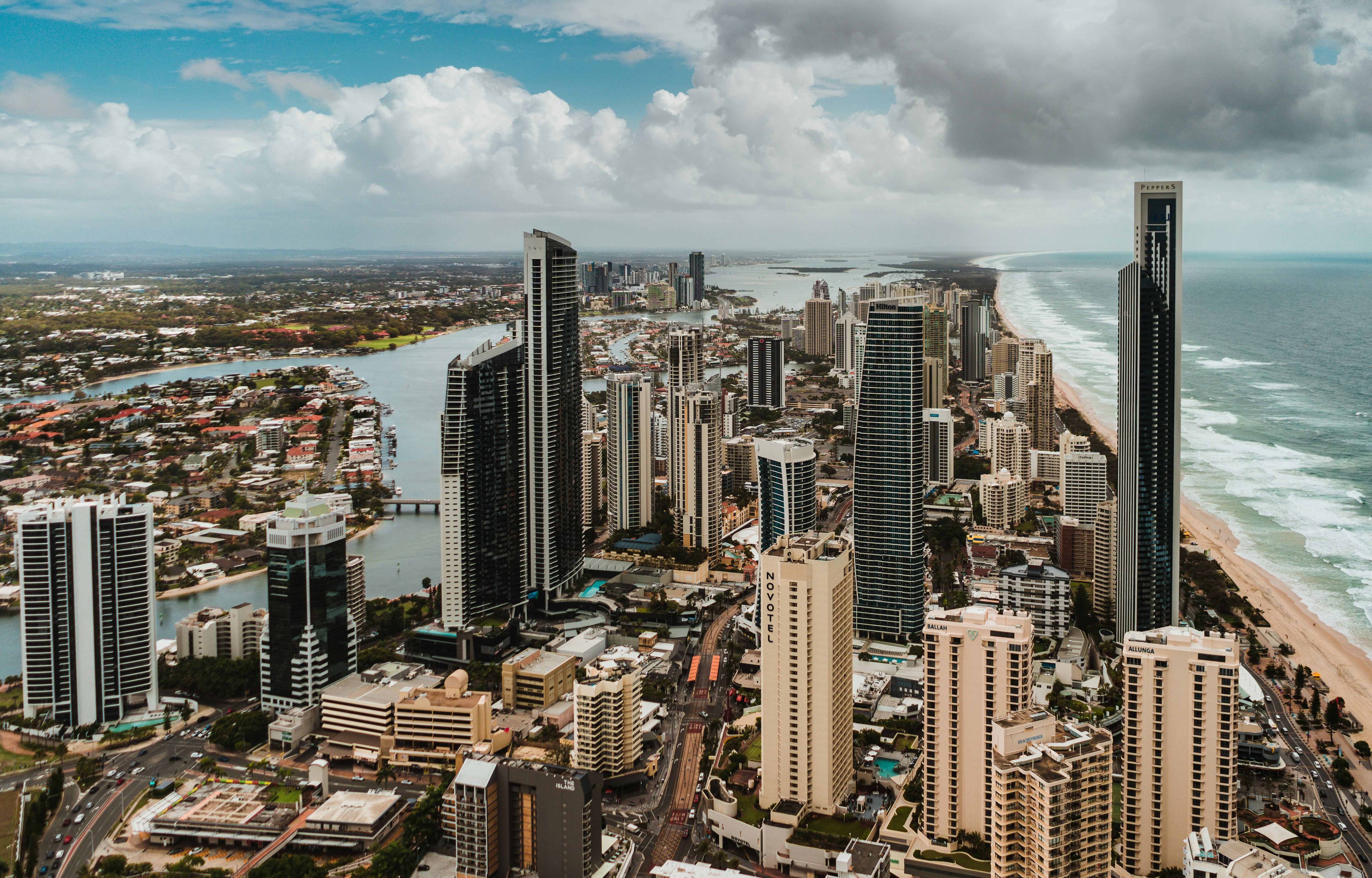 Aerial view of buildings near ocean photo – Free Beach Image on Unsplash