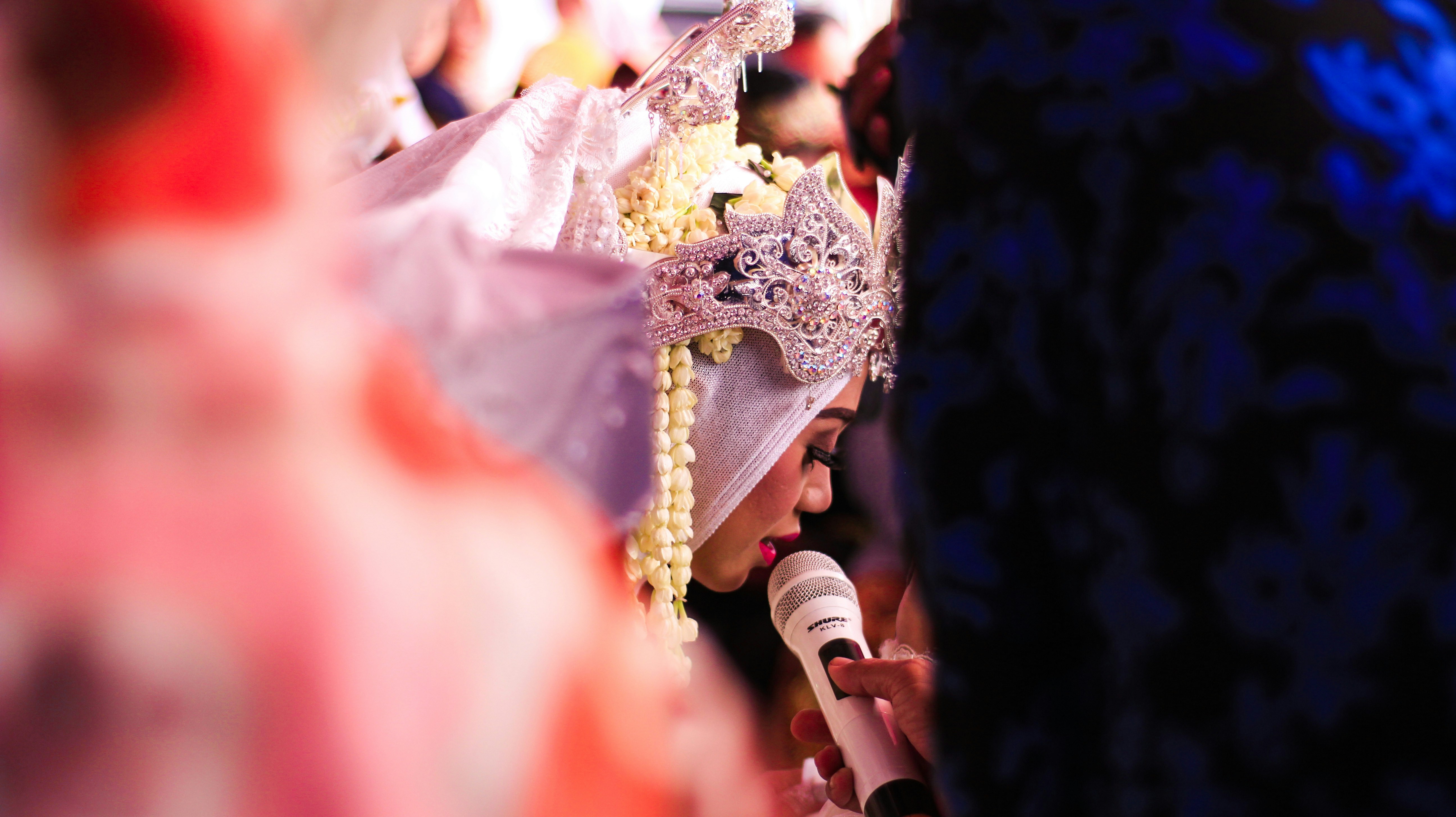 Crowned Singer at a Velvet-Cloaked Ceremony