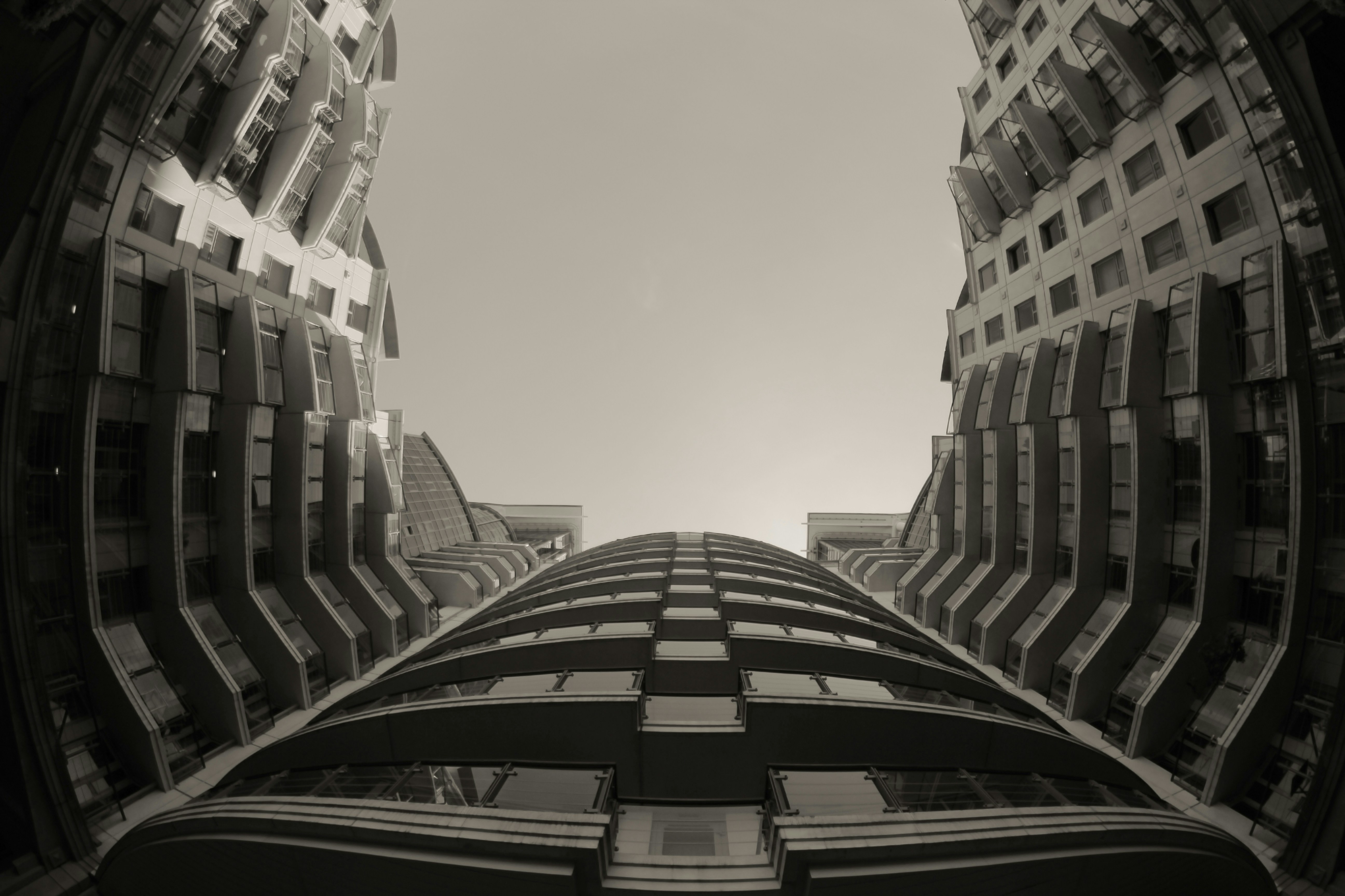 Skyward Convergence Between Twin Facades