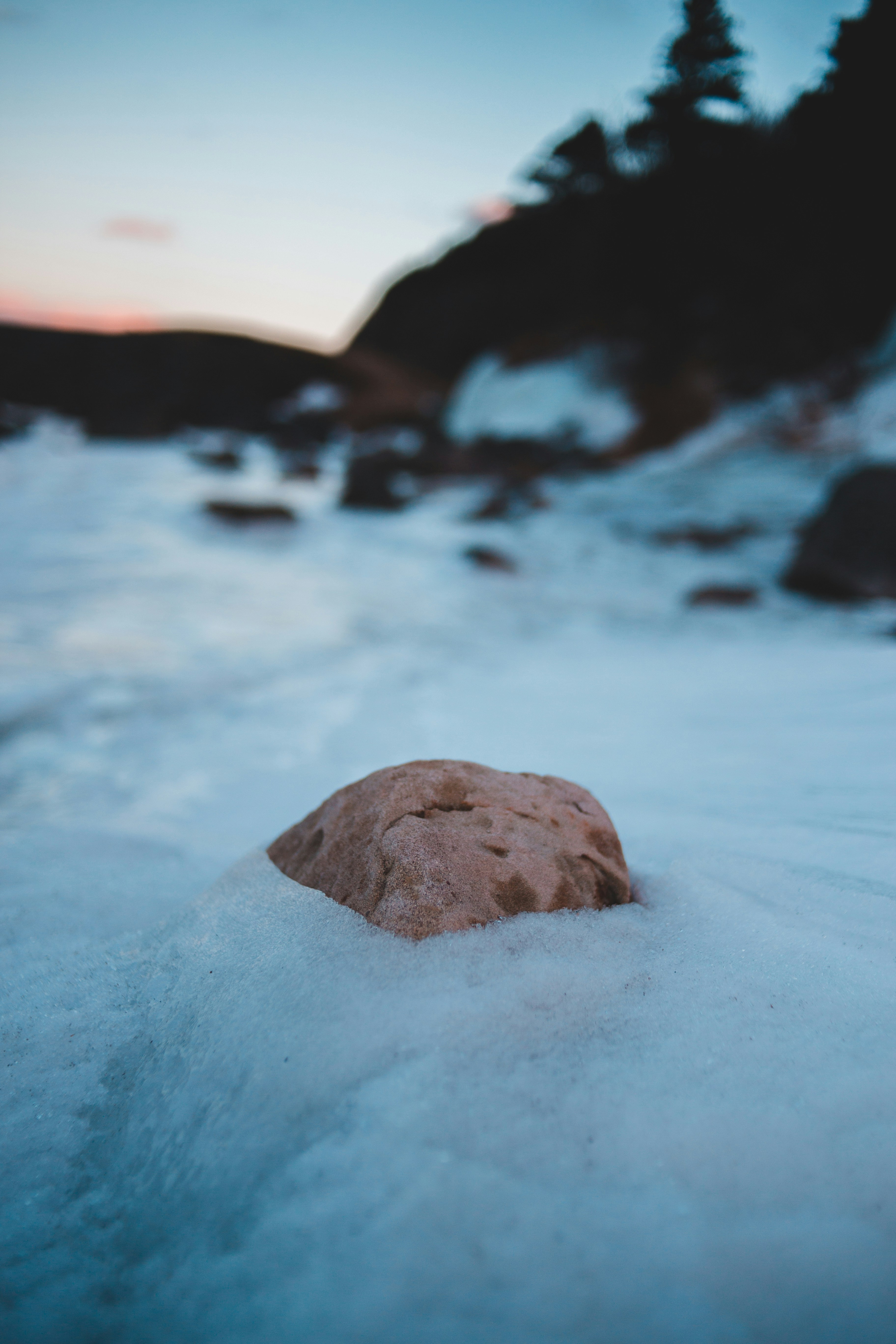 Frost-Rimed Rock on a Velvet Shore at Dusk