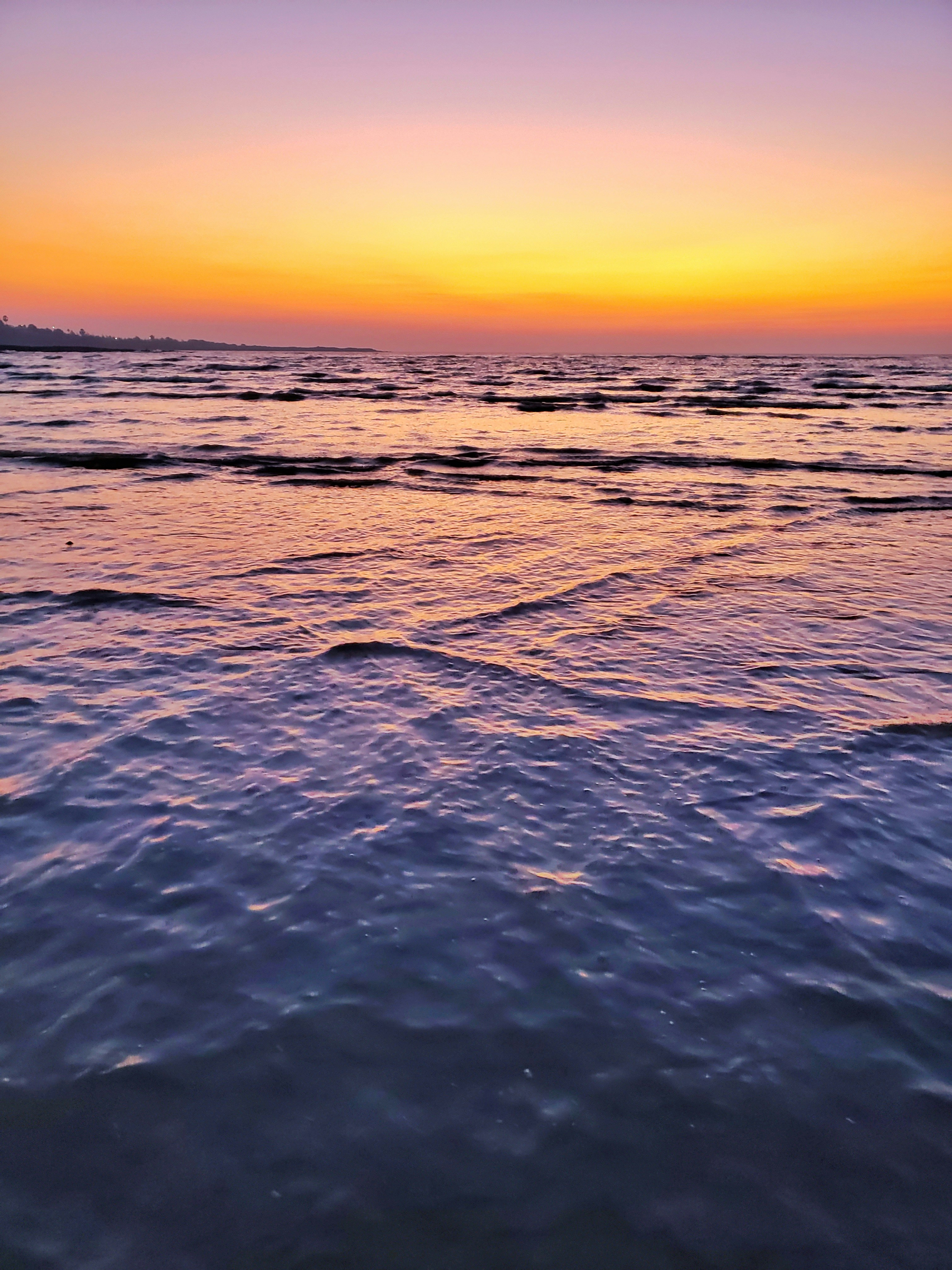 Horizon Flame over a Velvet Sea at Dusk