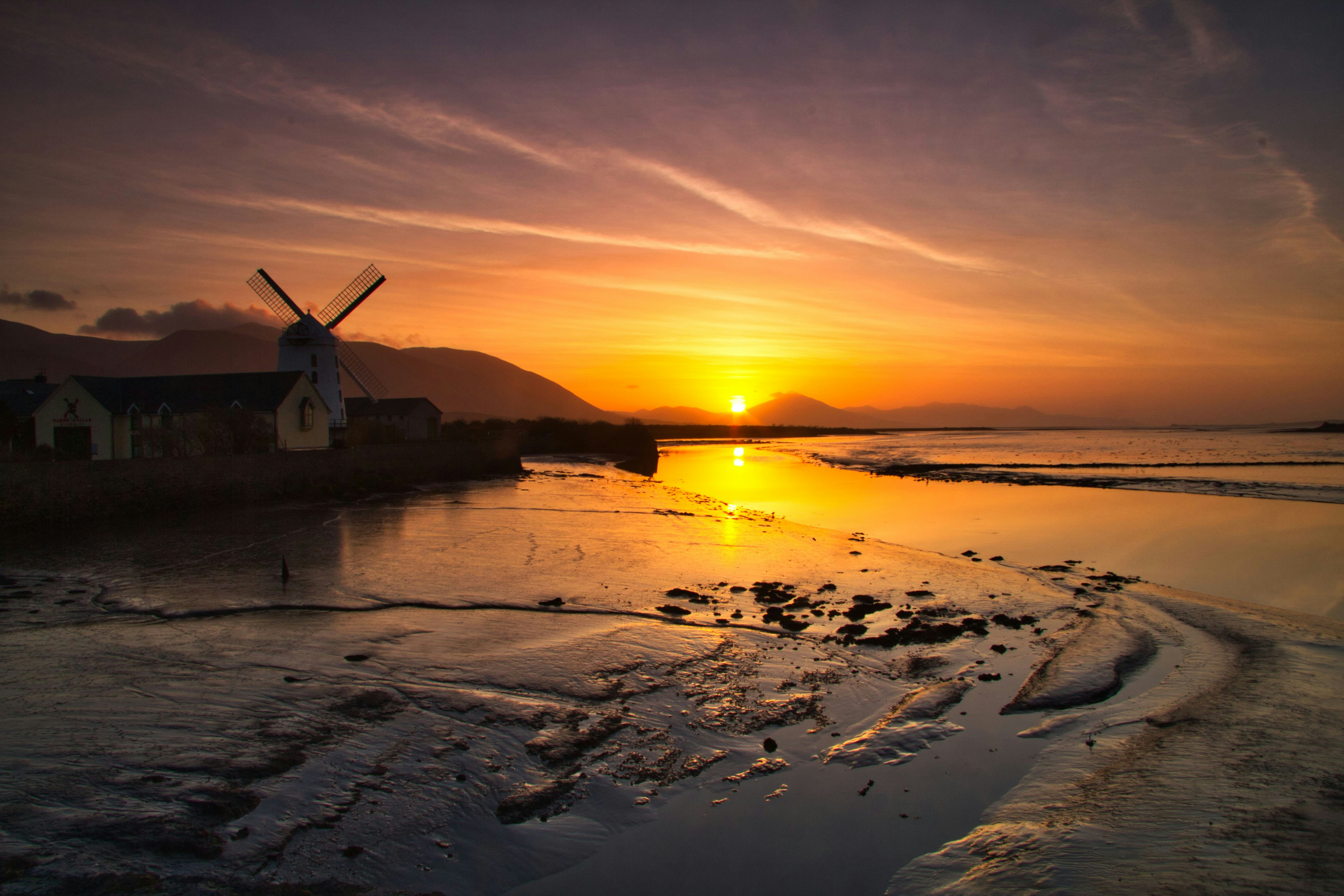 Body of water photo – Free Blennerville windmill Image on Unsplash