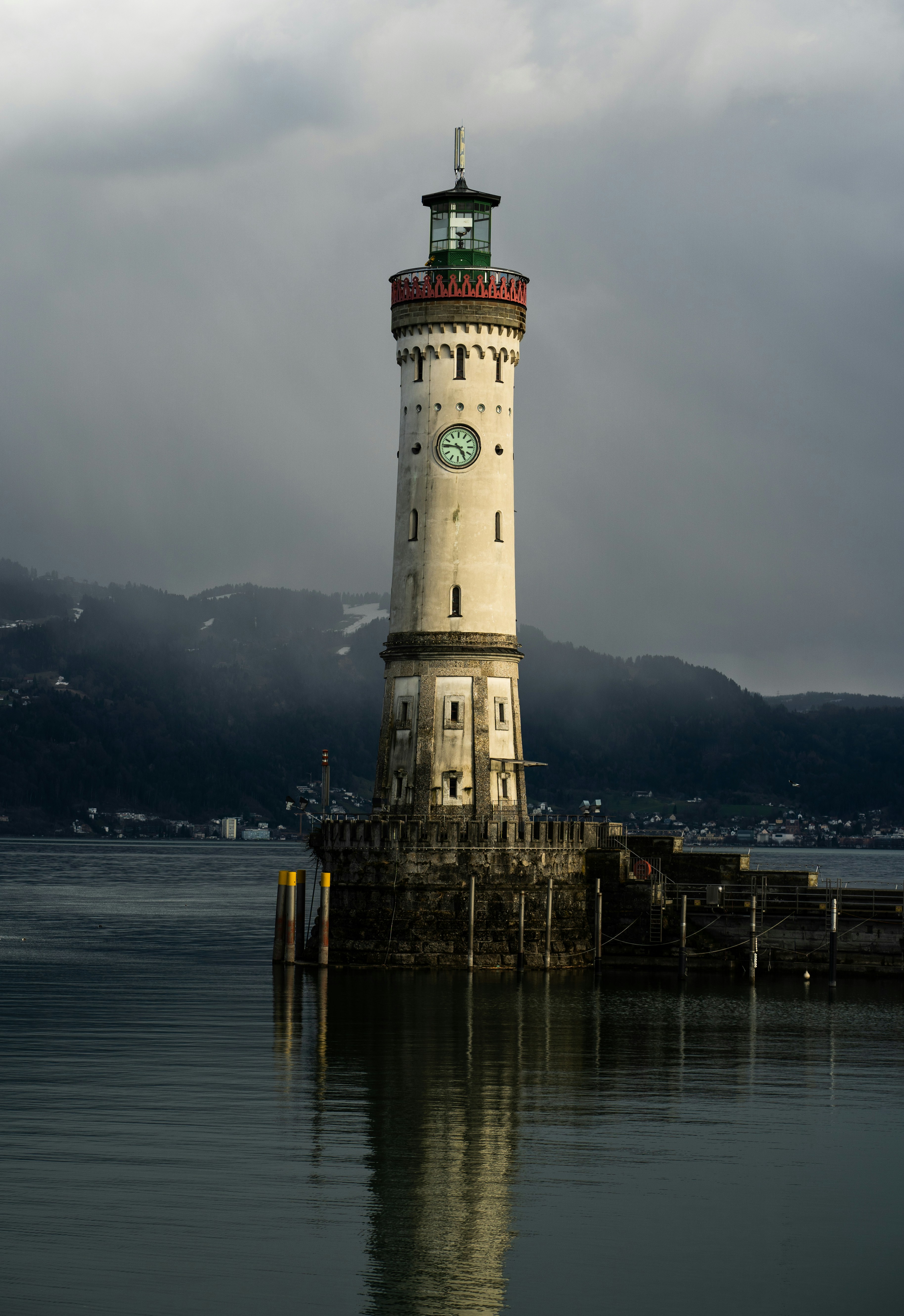 White lighthouse near calm body of water photo – Free Lighthouse Image ...