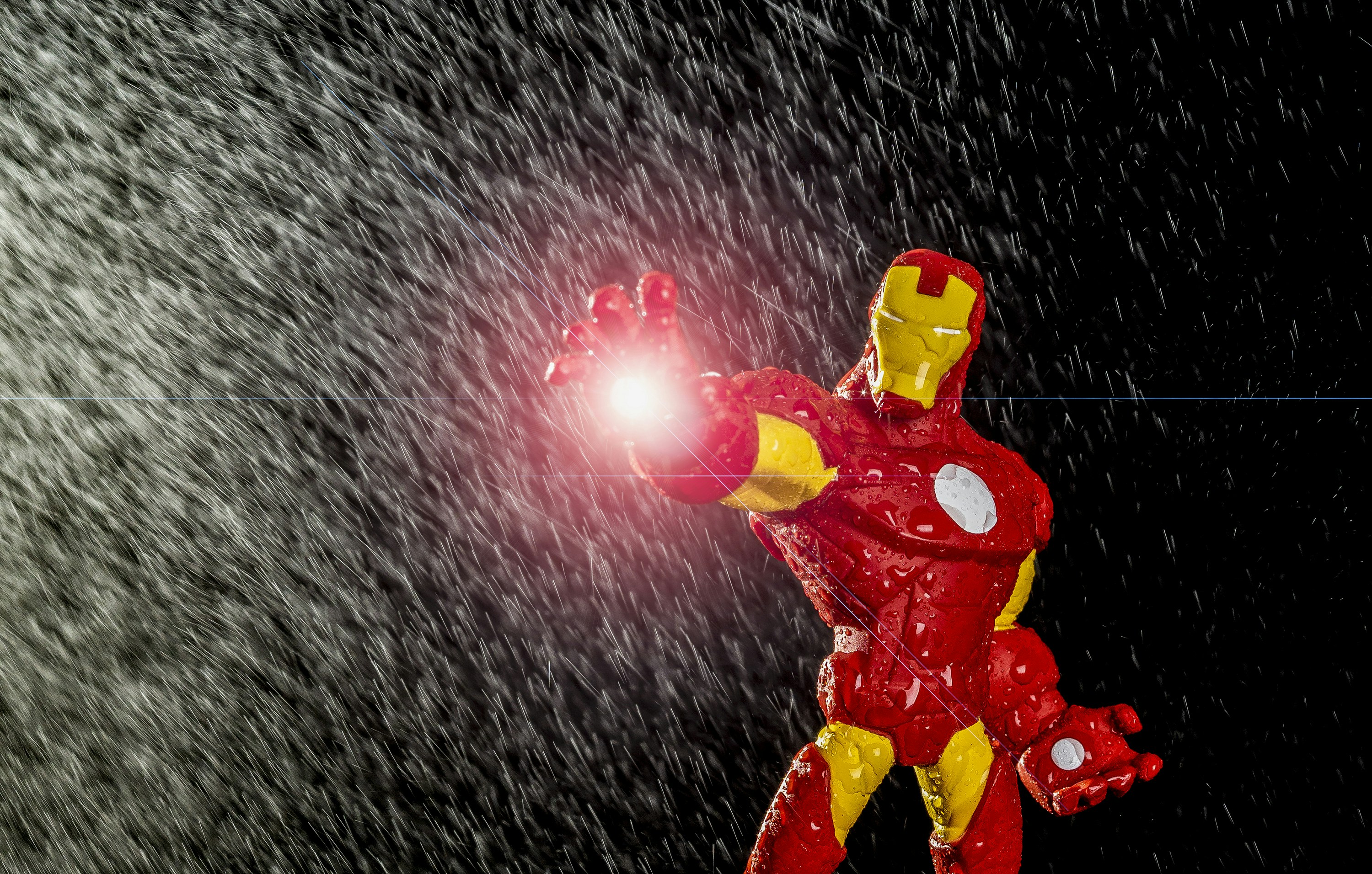 Repulsor Burst Through the Snow: Iron Man Toy in a Midnight Light