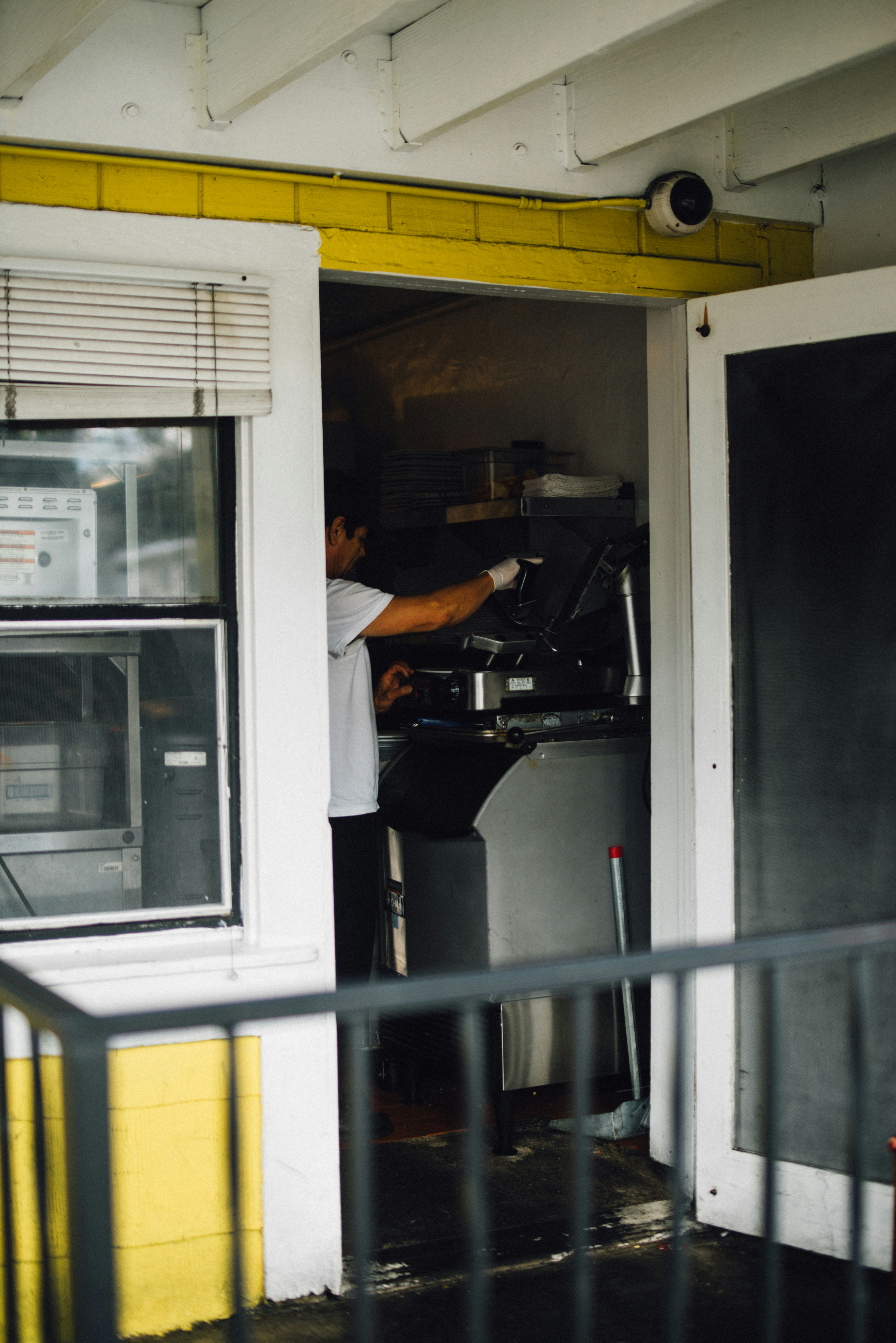 man holding kitchen appliance