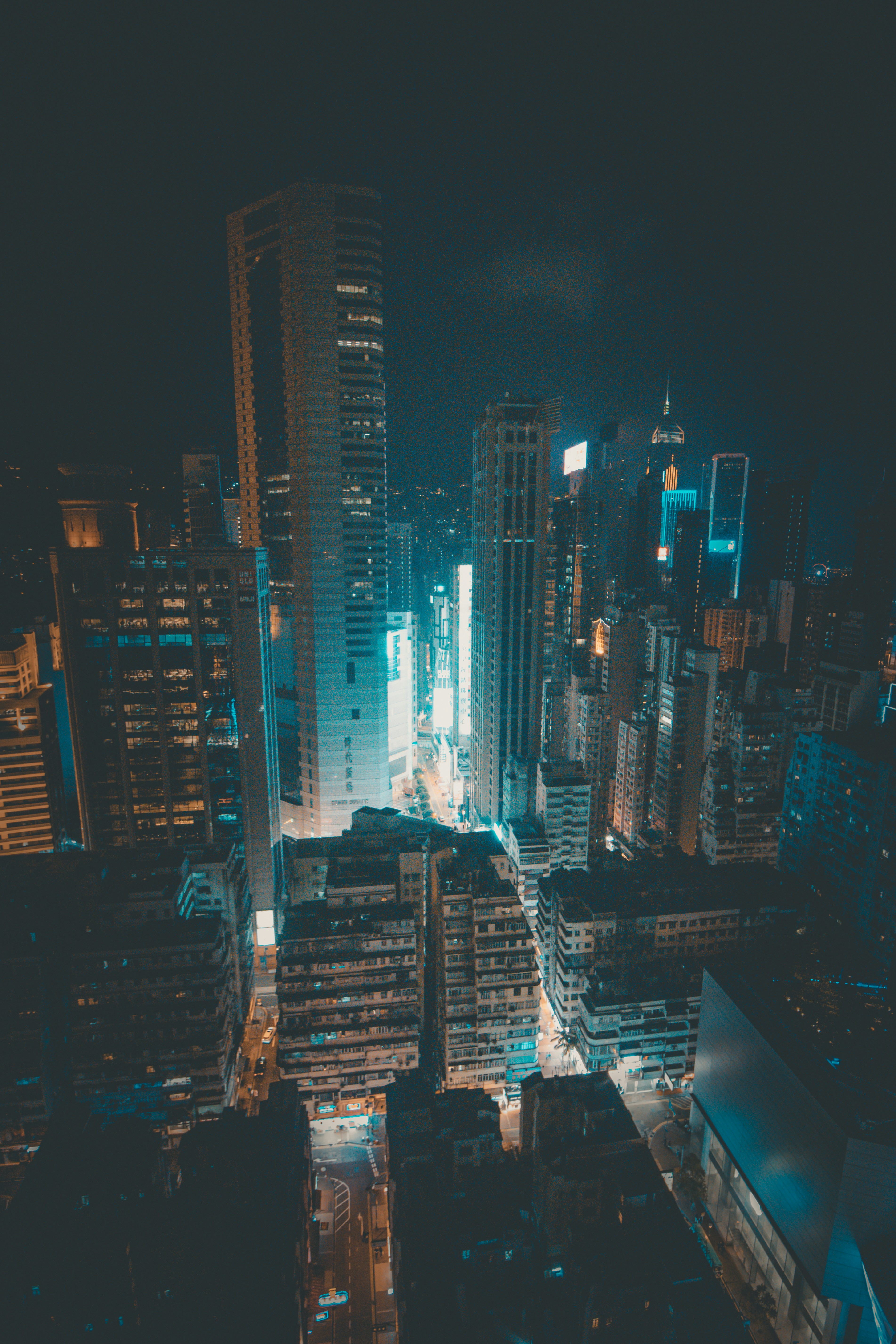 Lighted buildings at night photo – Free Landscape Image on Unsplash