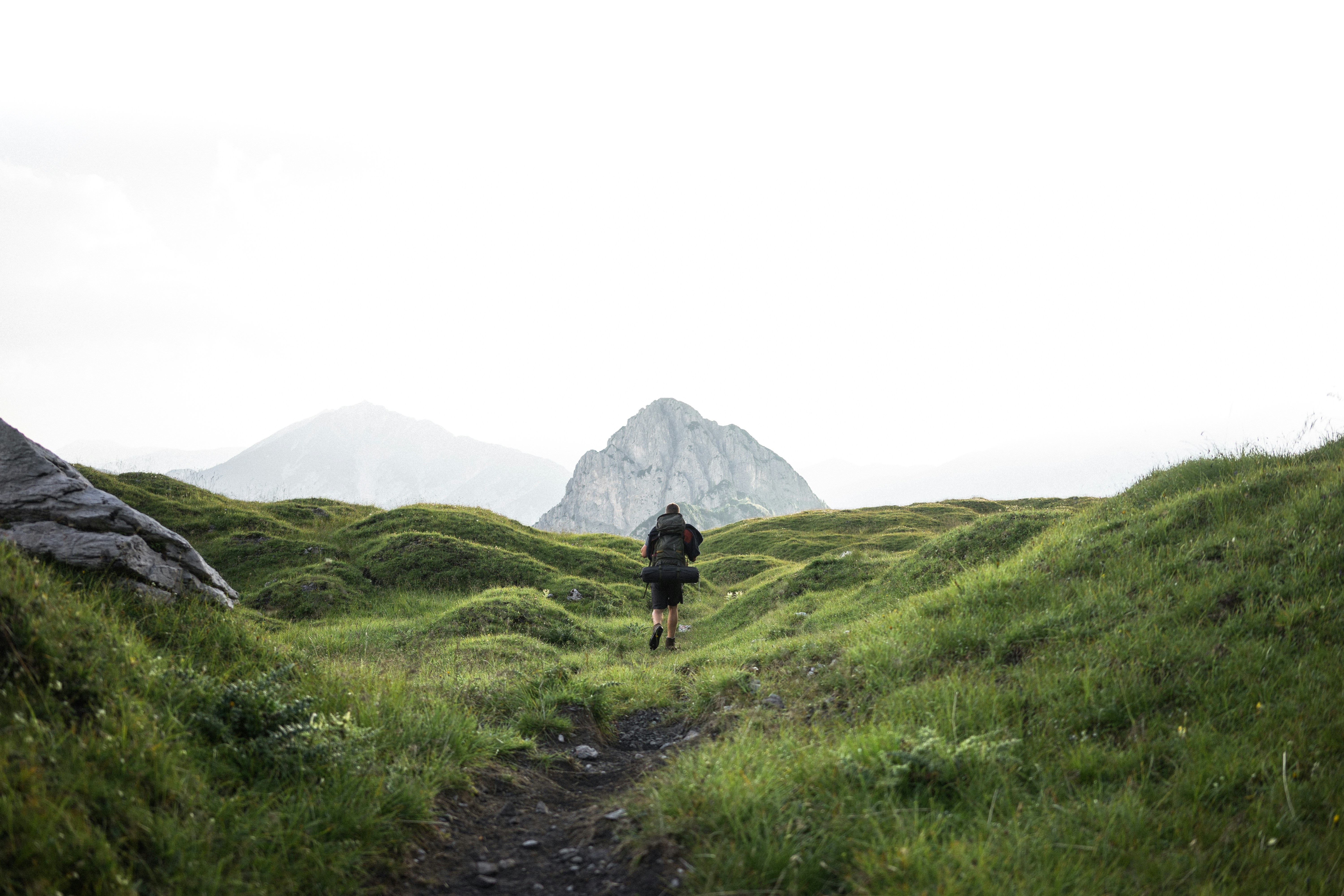 Person about to claim mountain photo – Free Nature Image on Unsplash