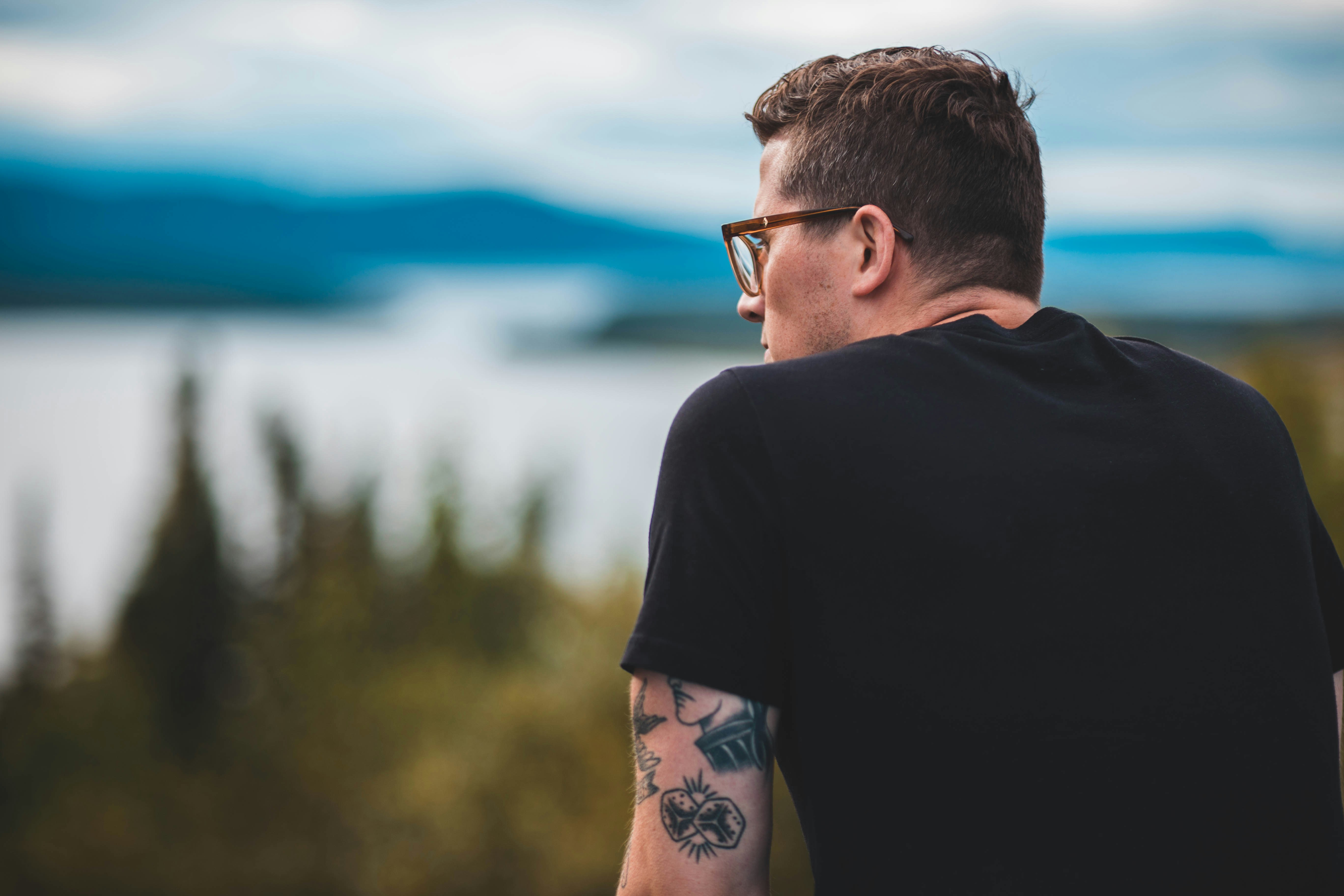 Portrait with Back-Shoulder View: Anonymity in a Quiet Landscape
