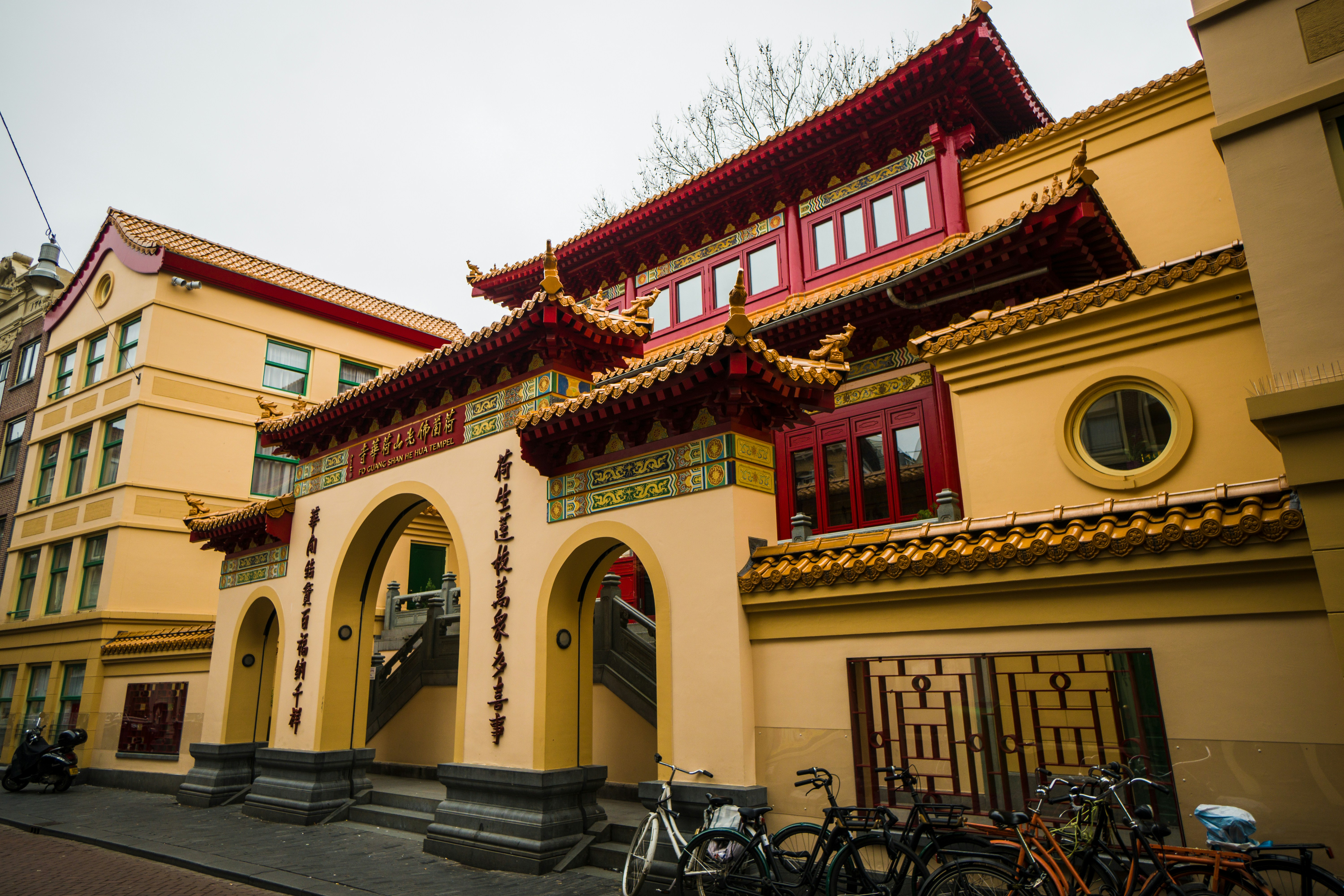 Amber Archway Courtyard: Morning Light on a Chinese Temple Gate