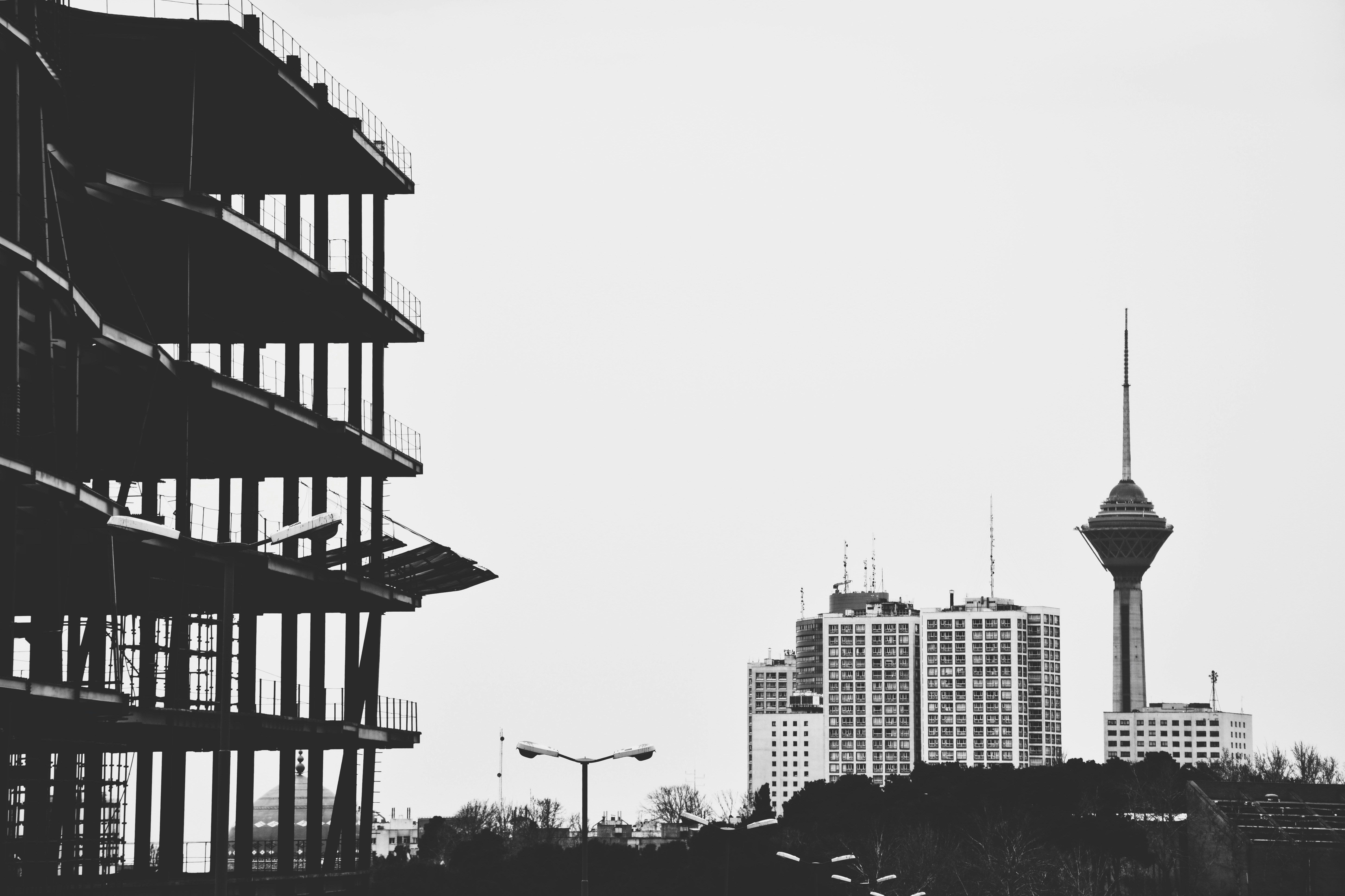 Urban Skeletons: A City Rising from Steel and Sky