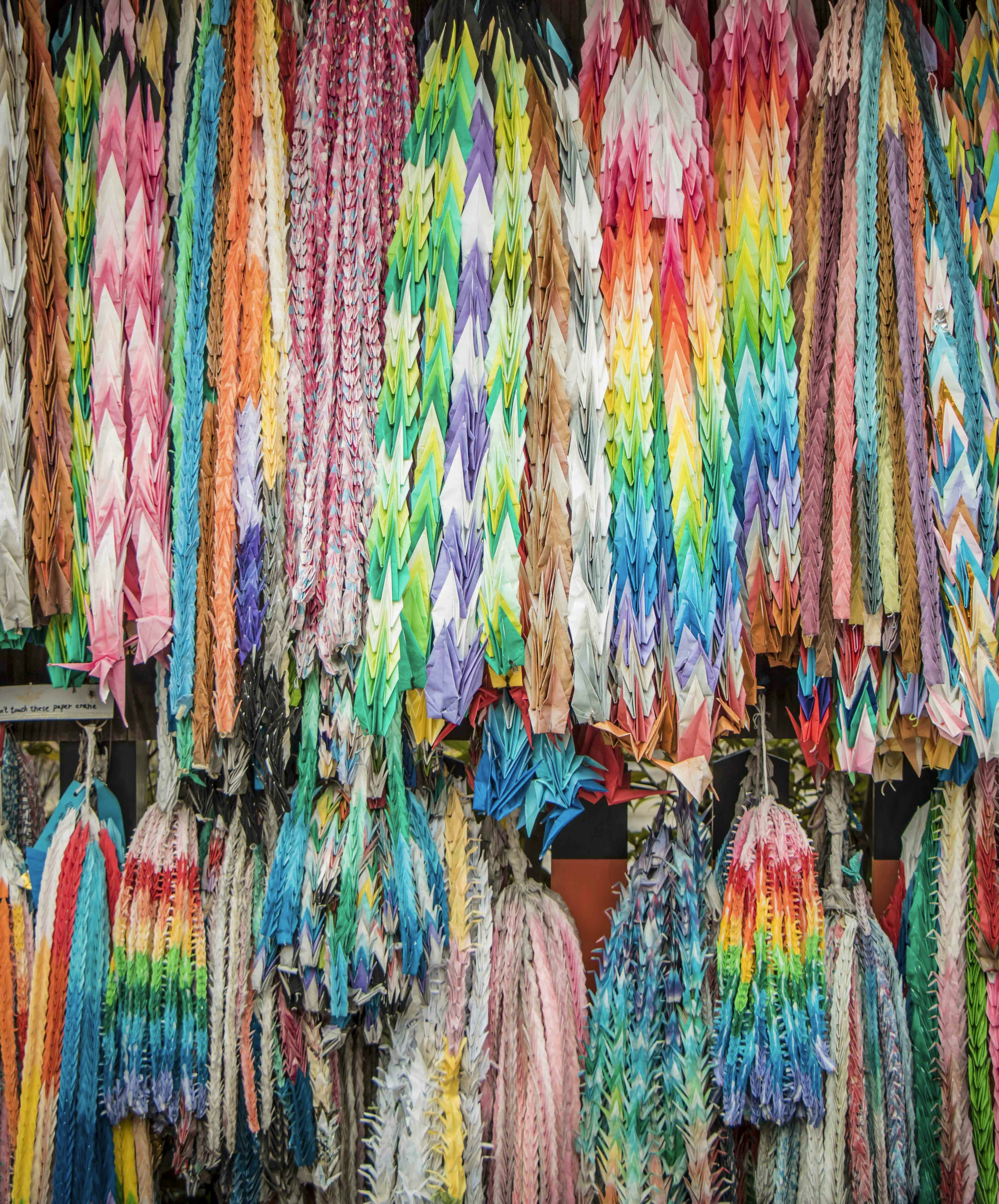 multicolored fabrics hanging on walls
