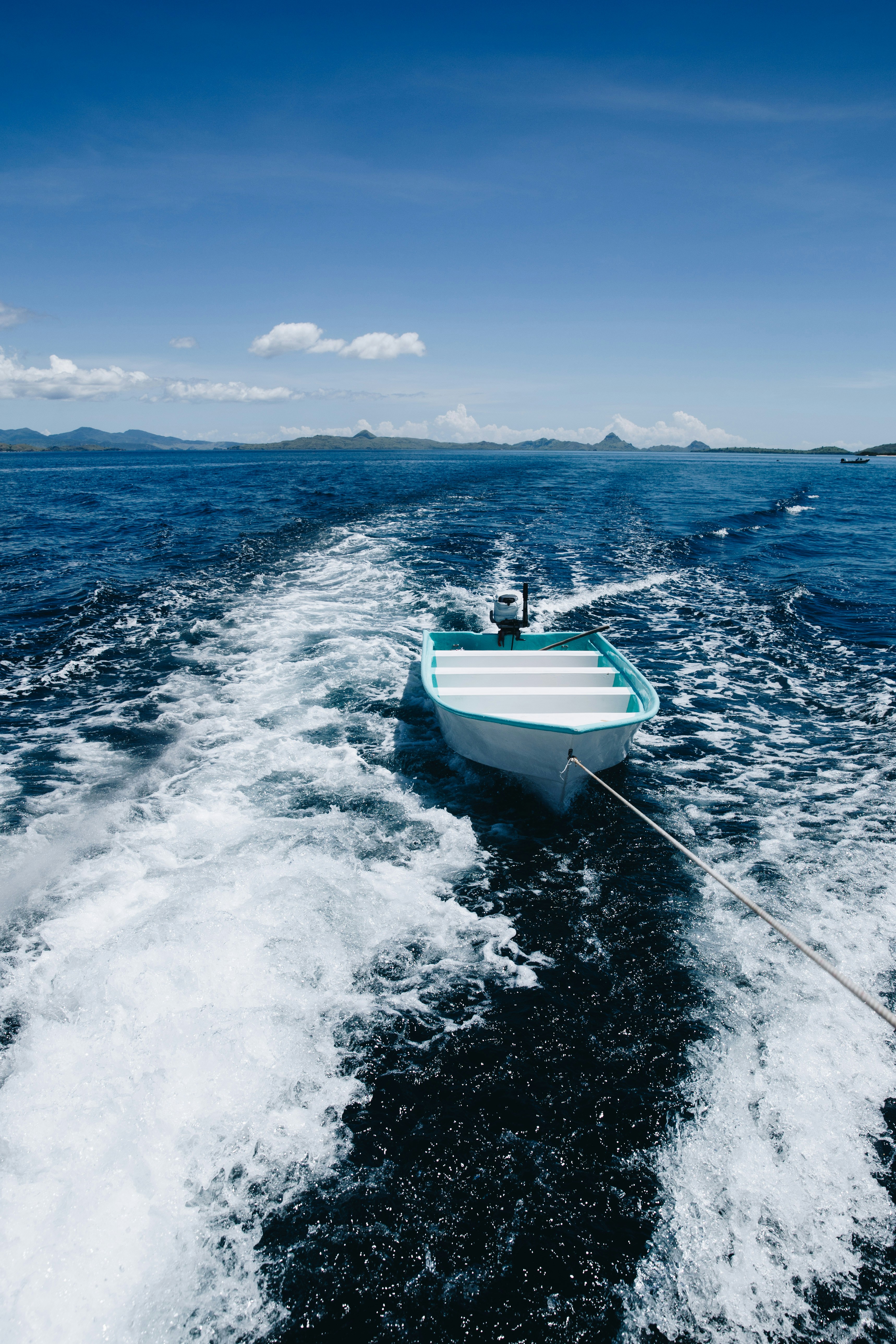 White and teal boat on body of water during daytime photo – Free Blue ...