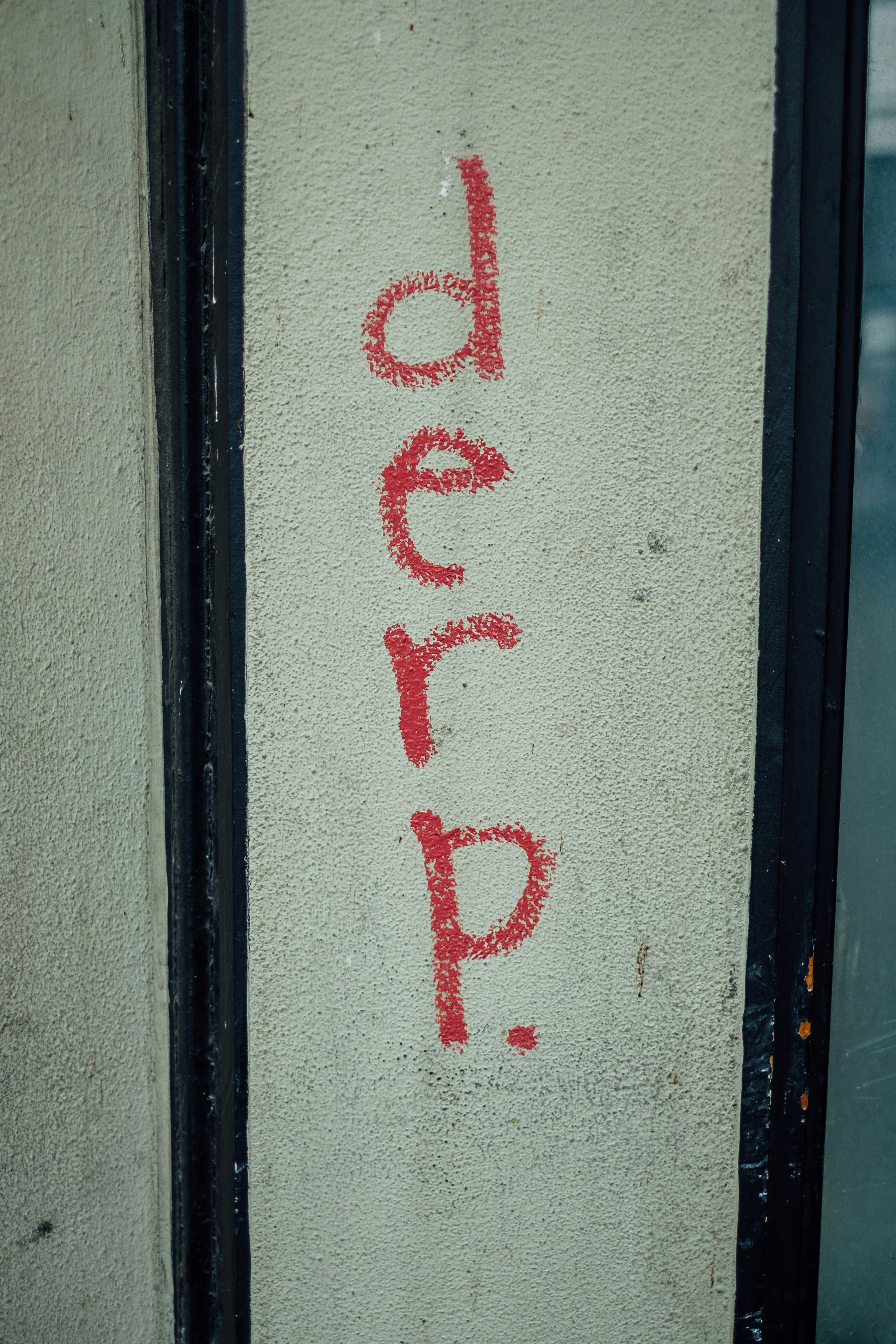 Gray wall with derp text photo – Free Wall Image on Unsplash