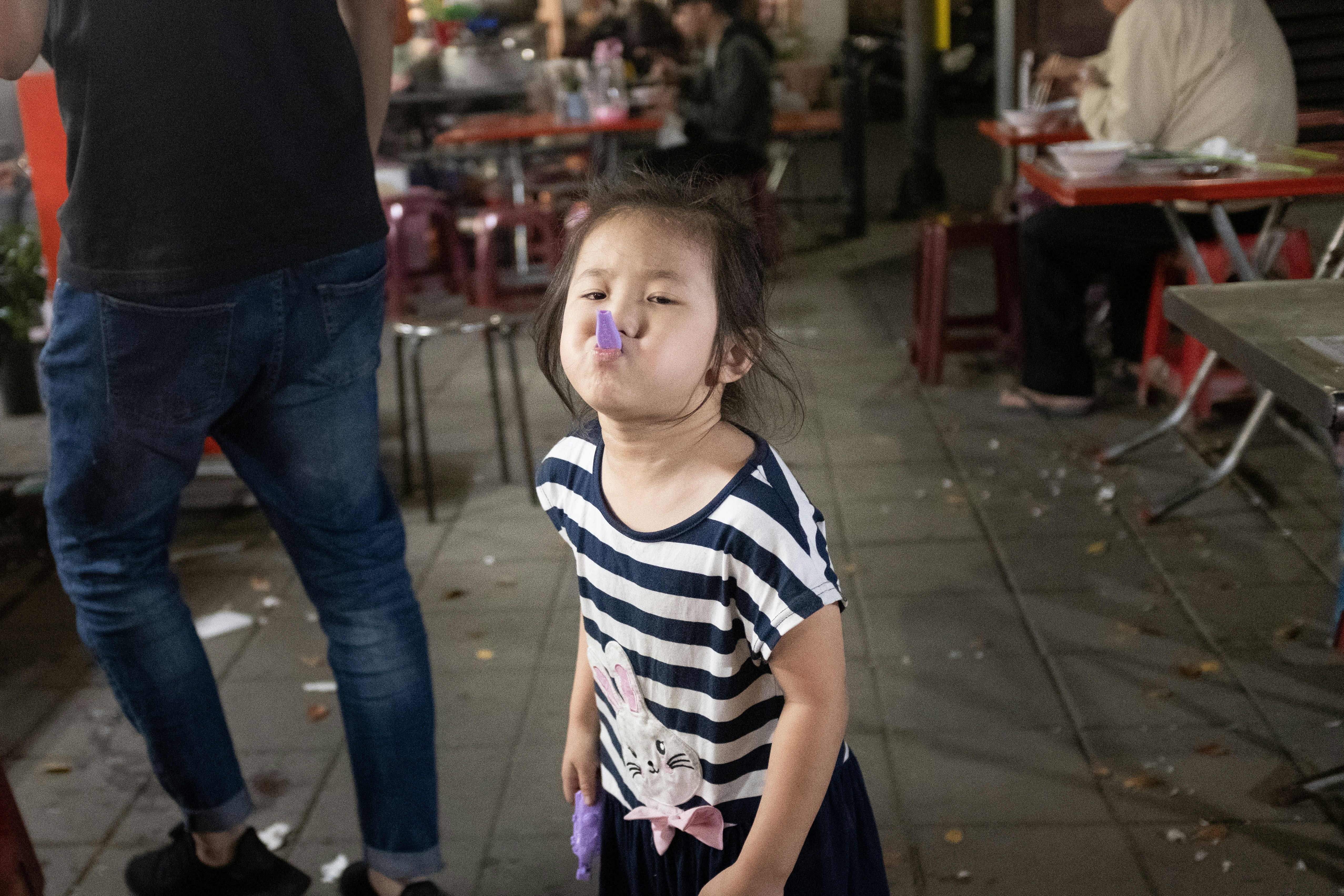 Purple-Nose Moment: Striped Shirt, Street Market, Pure Playfulness