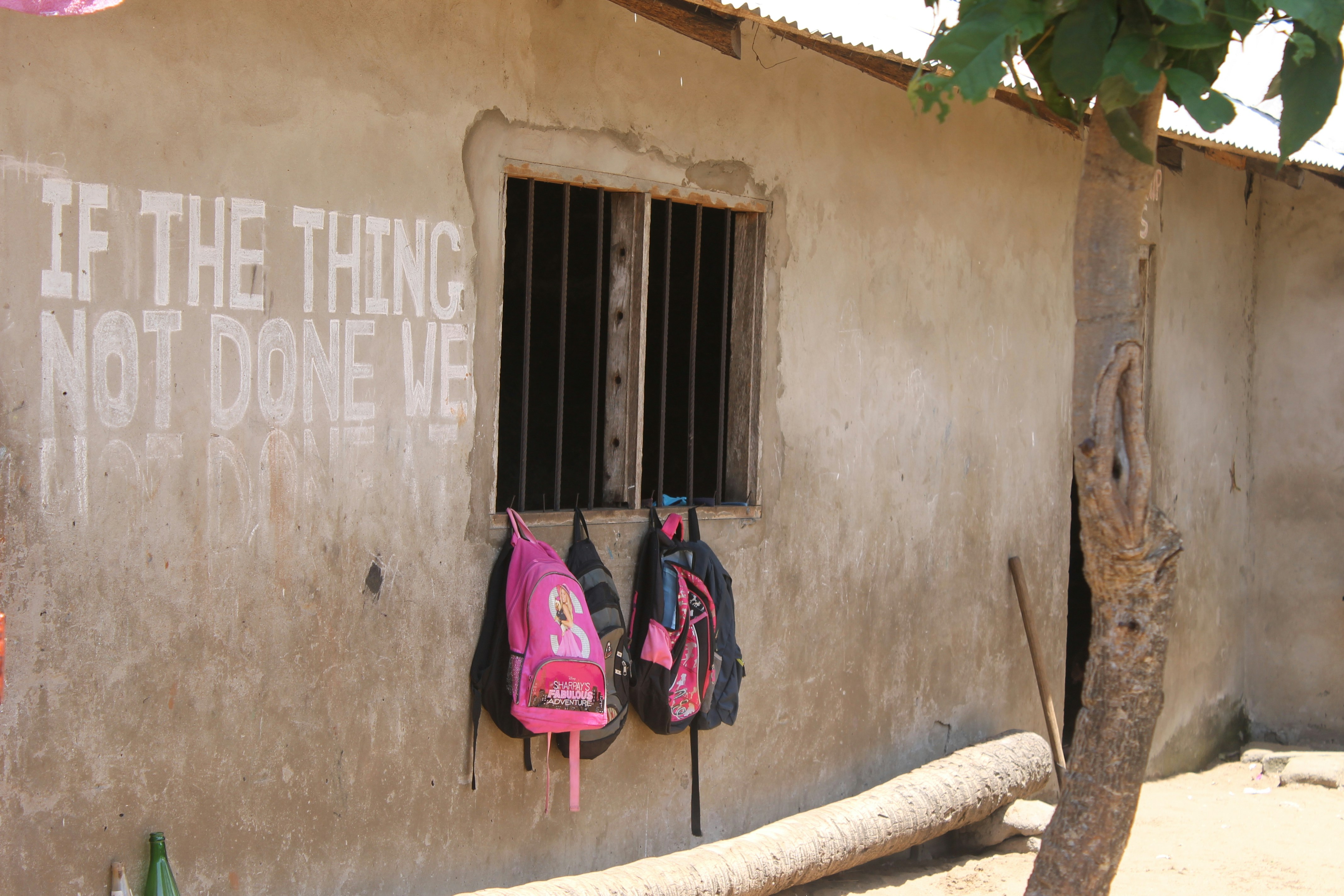 Three backpacks hang on window during daytime photo – Free Bag Image on ...