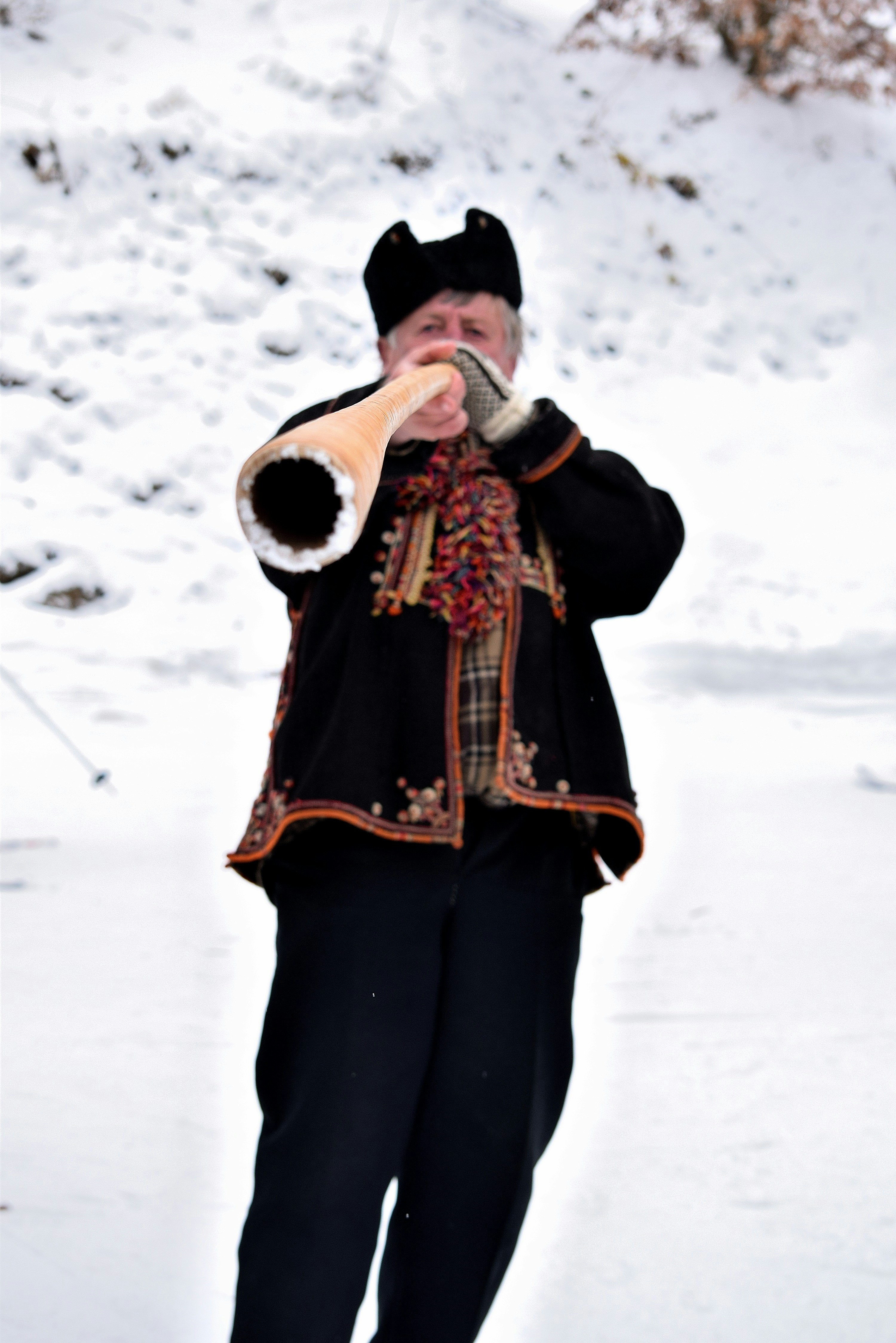 Man holding road while standing on snow field photo – Free Carpathian ...