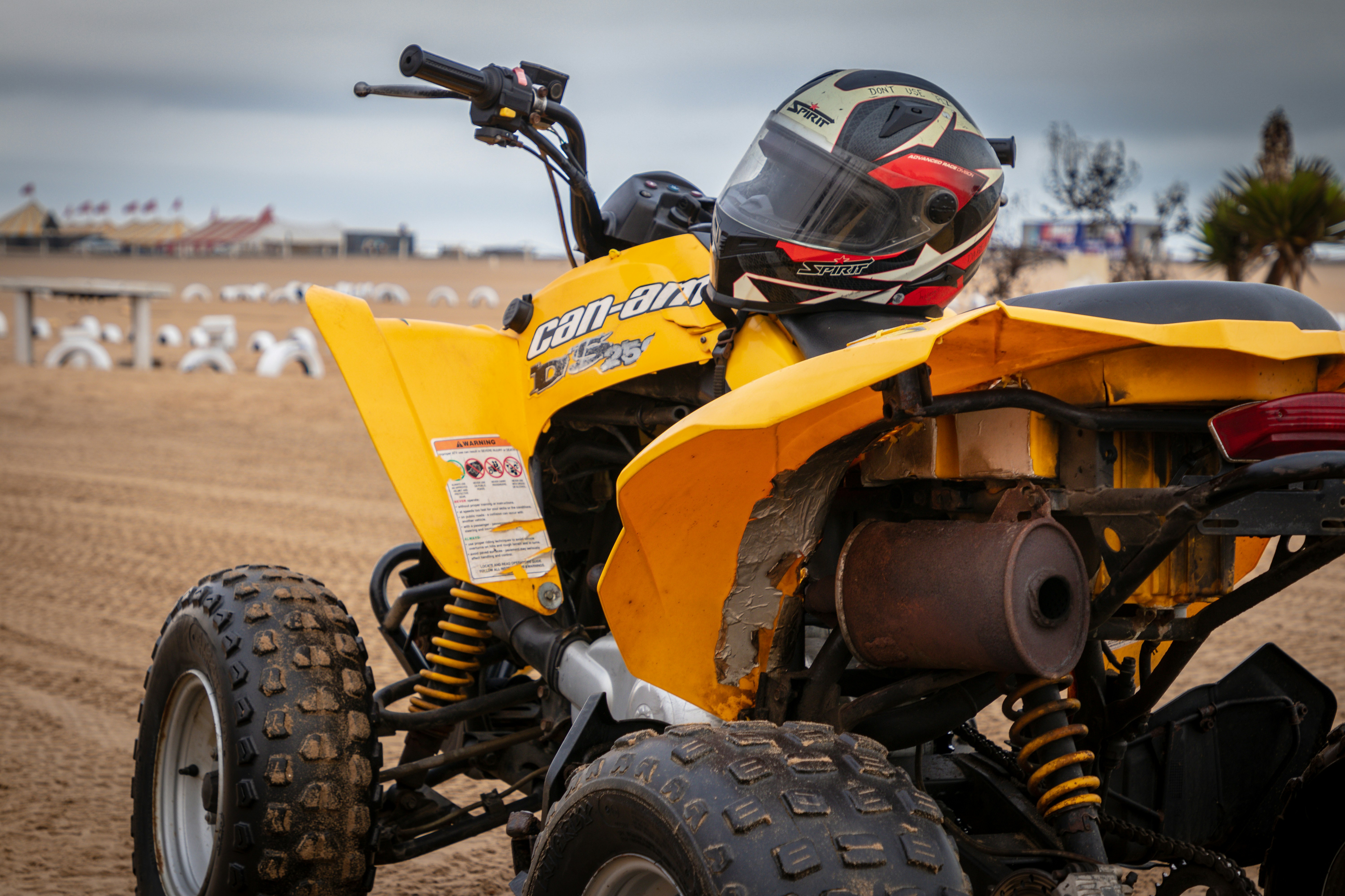 Yellow ATV on field at daytime photo – Free Clothing Image on Unsplash