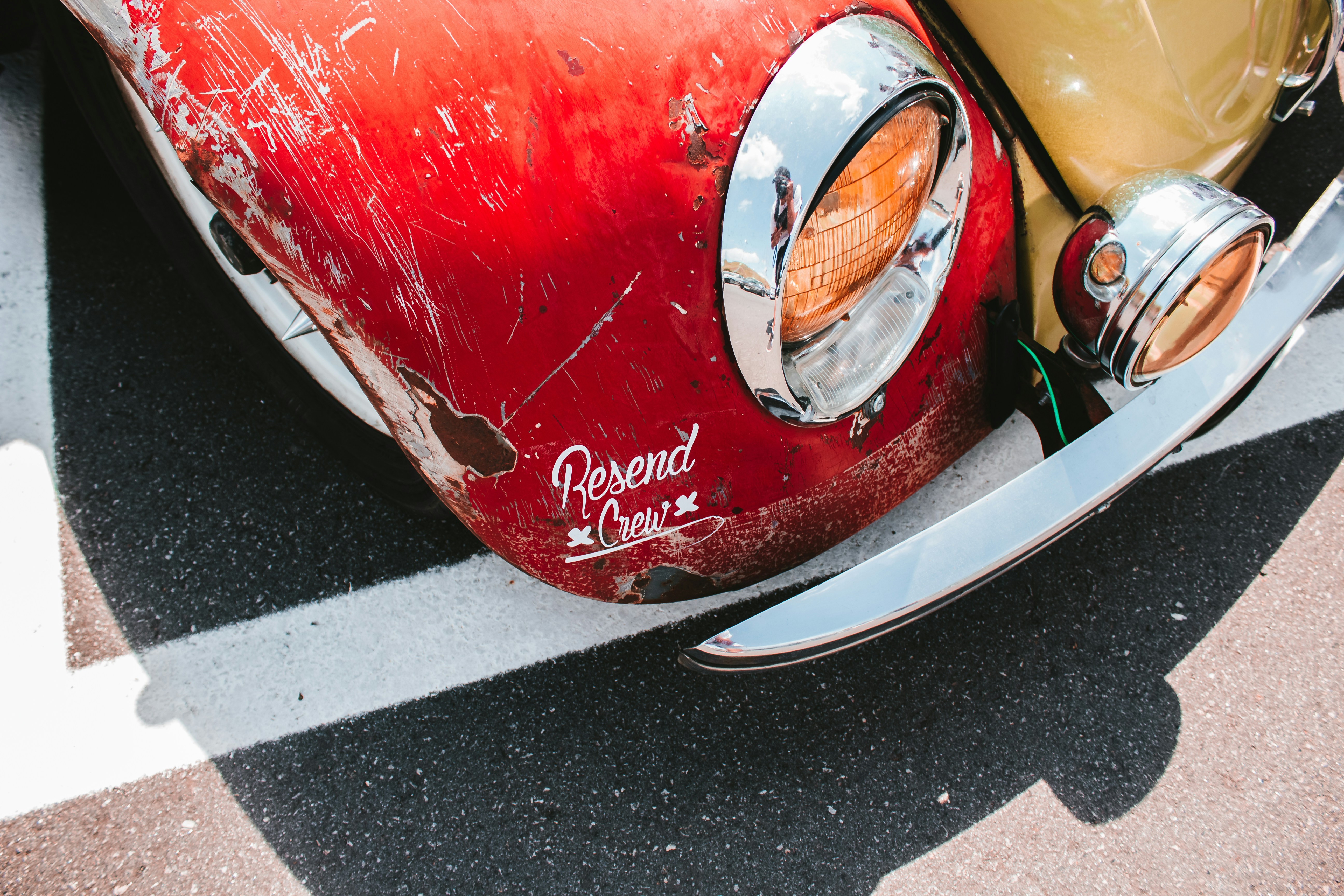 Vintage Front End: Rust, Chrome, and Crew Script on a Weathered Classic Car