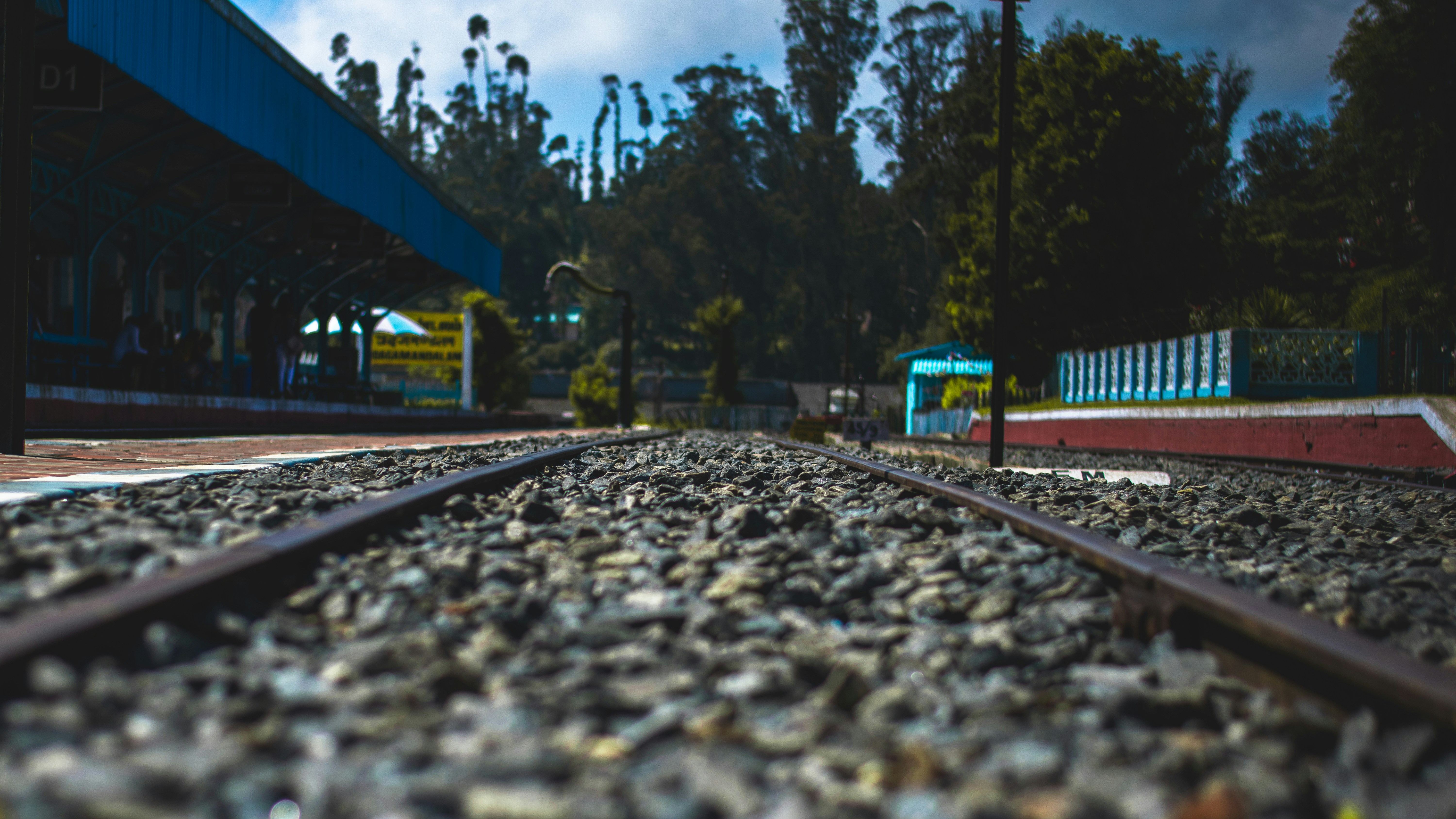 Converging Rails: A Ground-Level Perspective Toward the Quiet Platform
