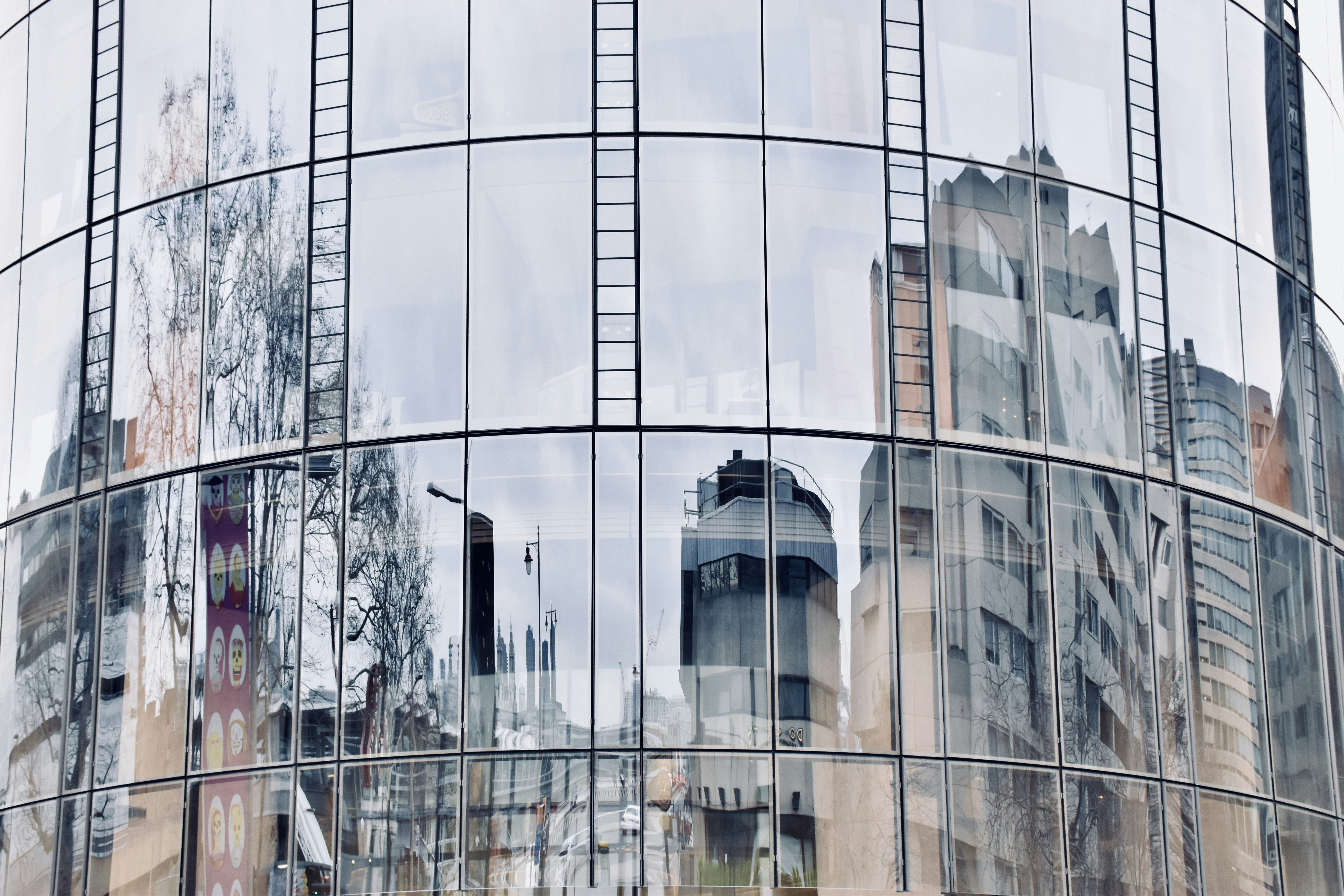 Reflections in a Glass Facade: City Lines Behind the Surface