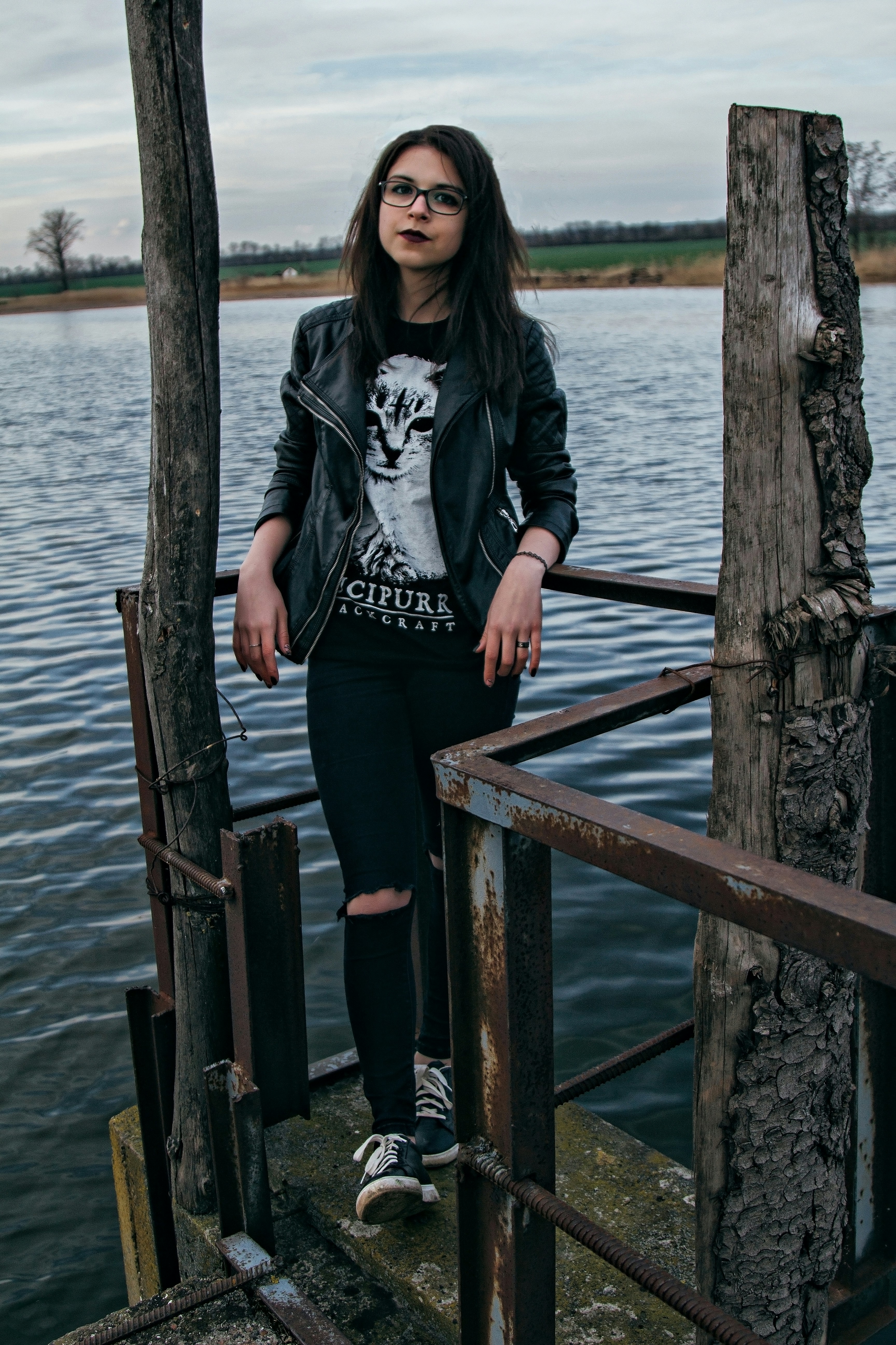 Leather Light by the Lake: A Solitary Portrait on a Weathered Pier