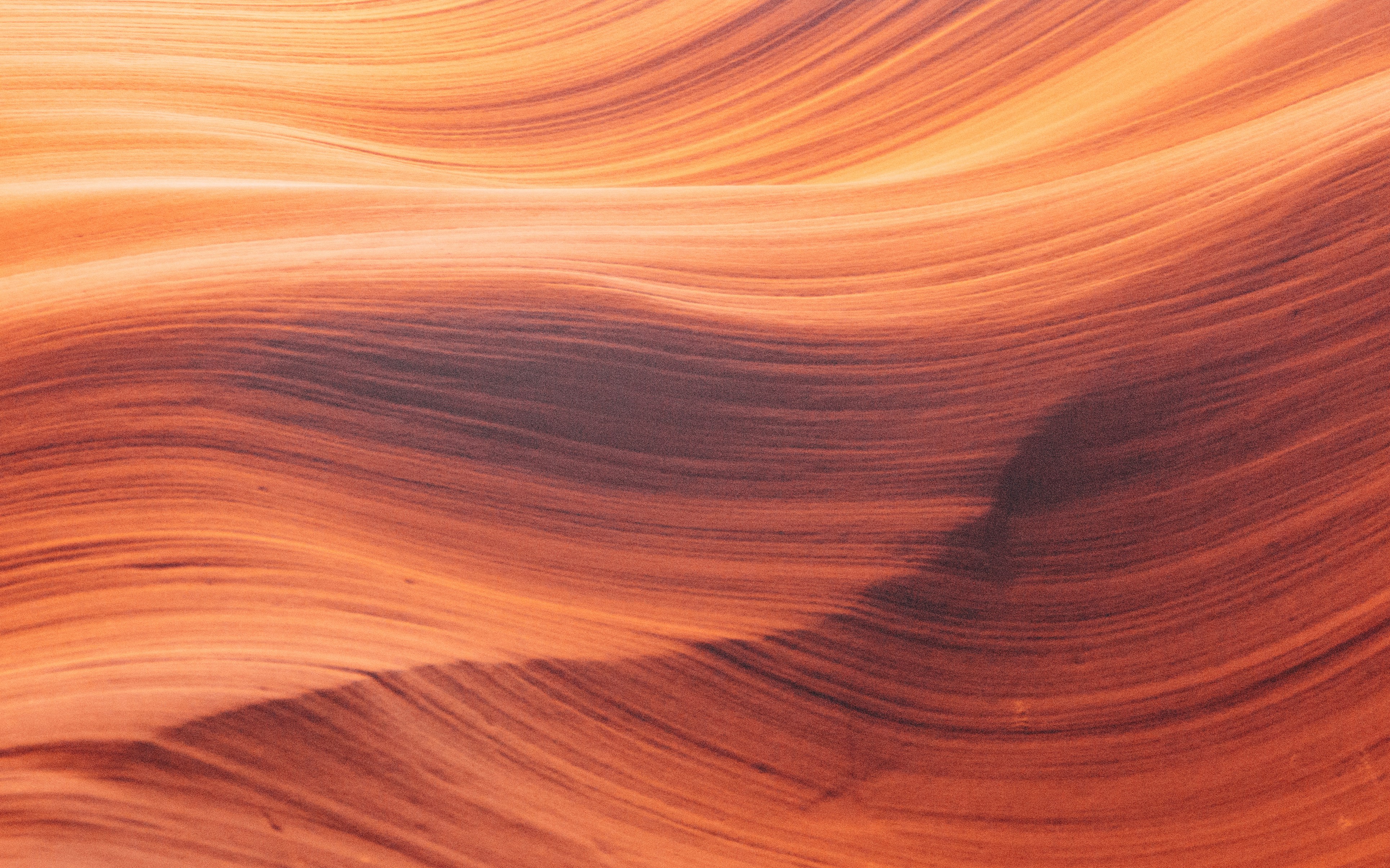 A close up of a rock formation with wavy lines photo – Free Grey Image ...