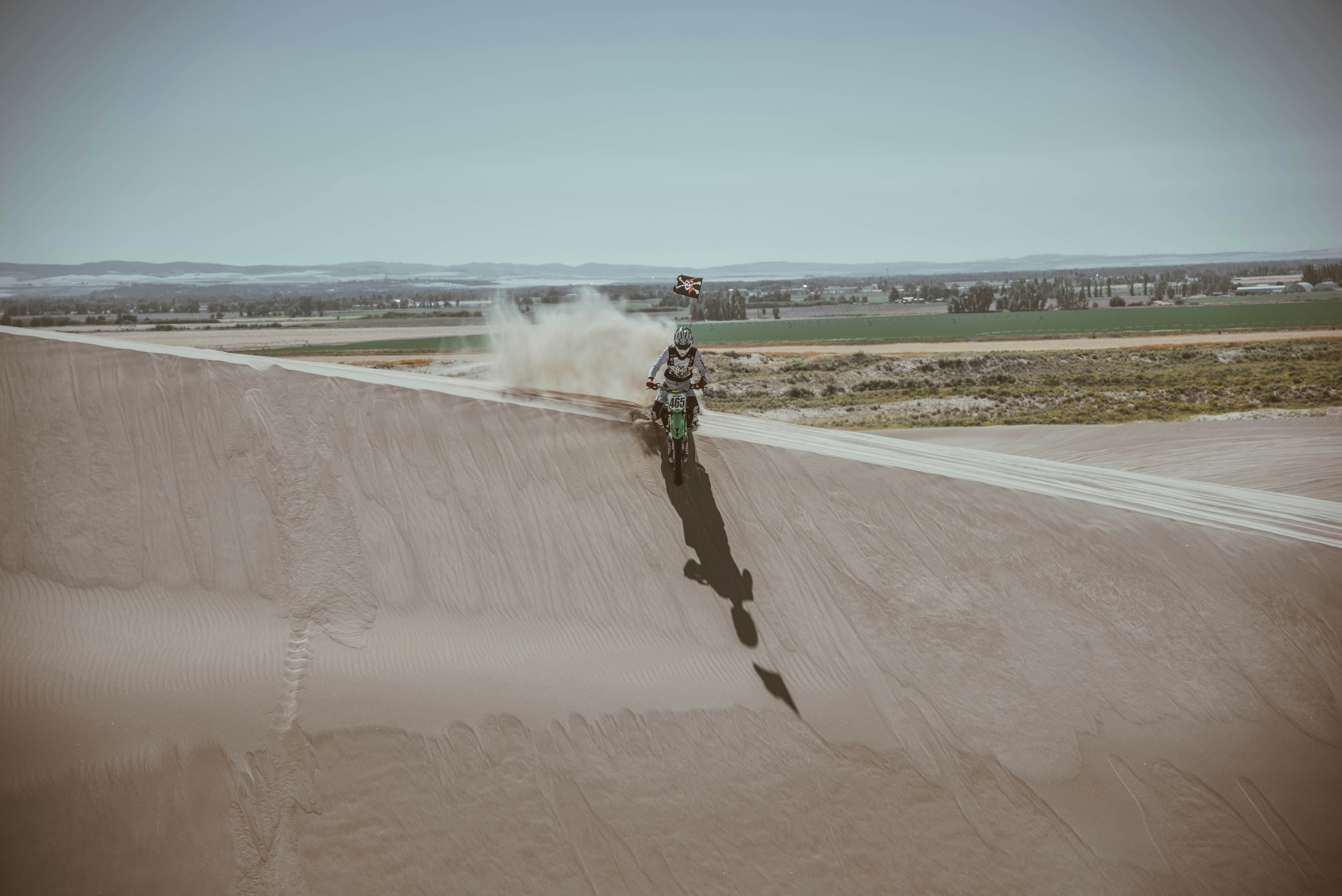 Man rising dirt bike photo – Free Sand Image on Unsplash