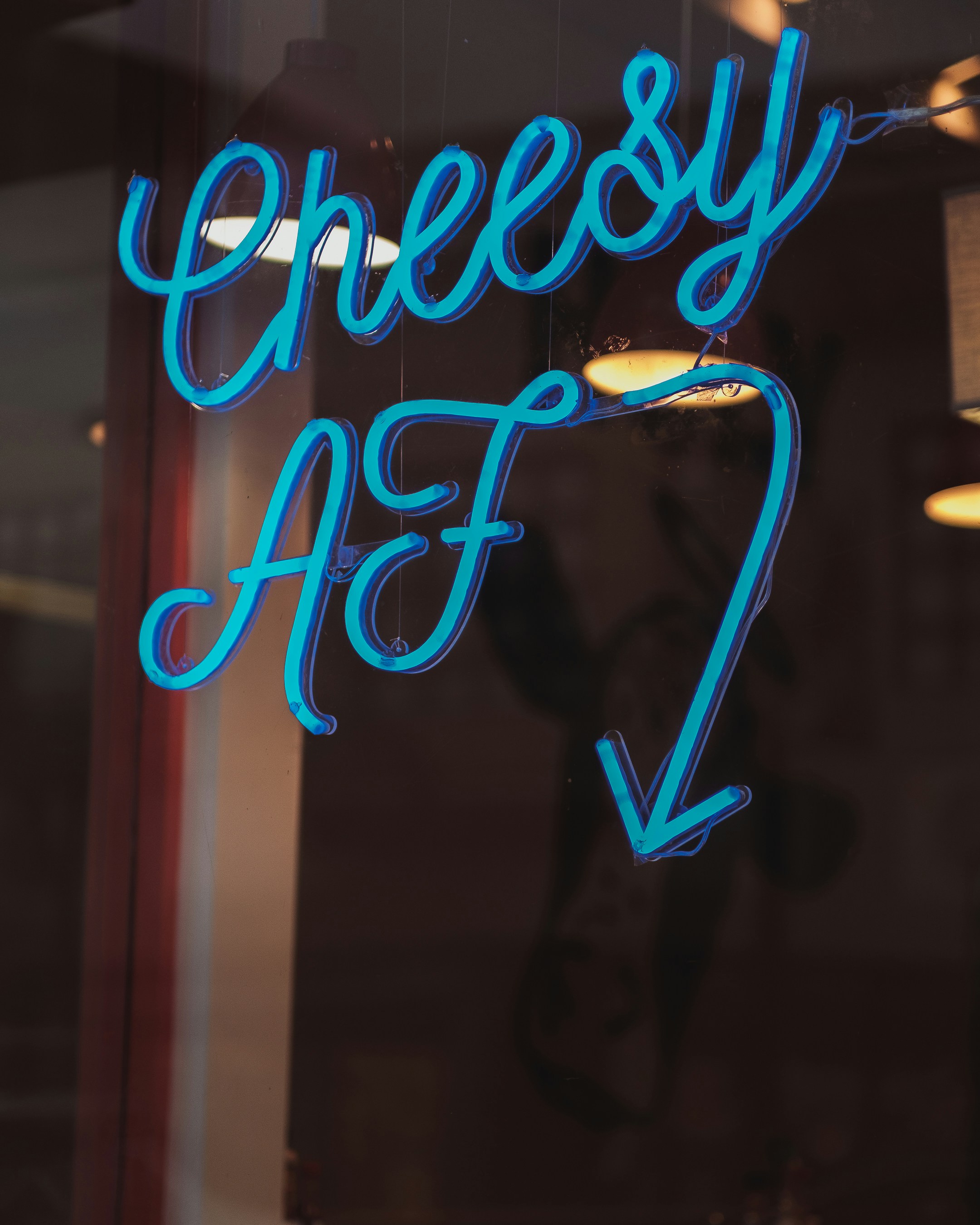 Cheesy af signage photo – Free Restaurant Image on Unsplash