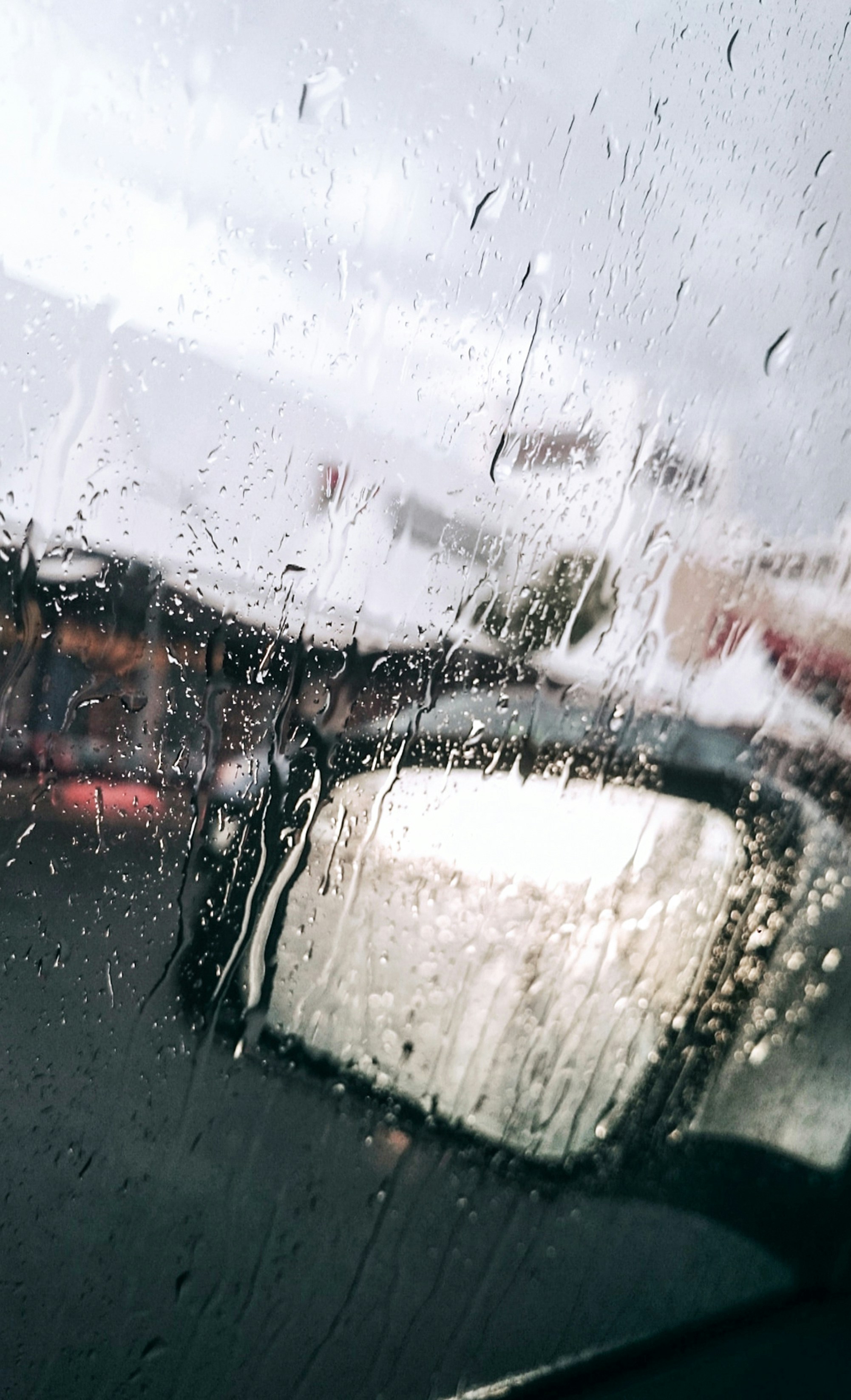 Rainy Reflections Through the Window PaneMohamed M