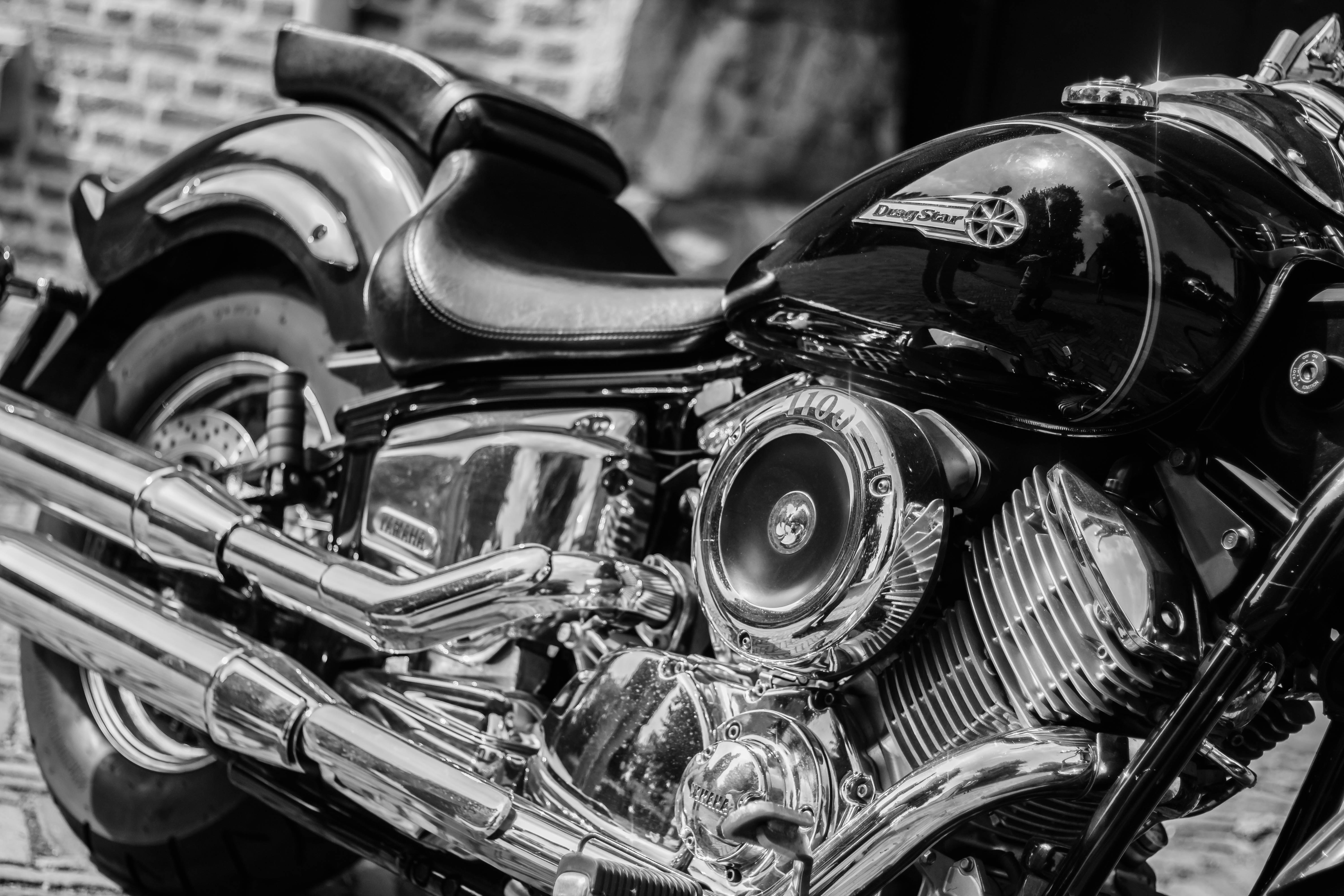 Close-up of a sleek motorcycle engine showcasing intricate chrome details and powerful design elements.