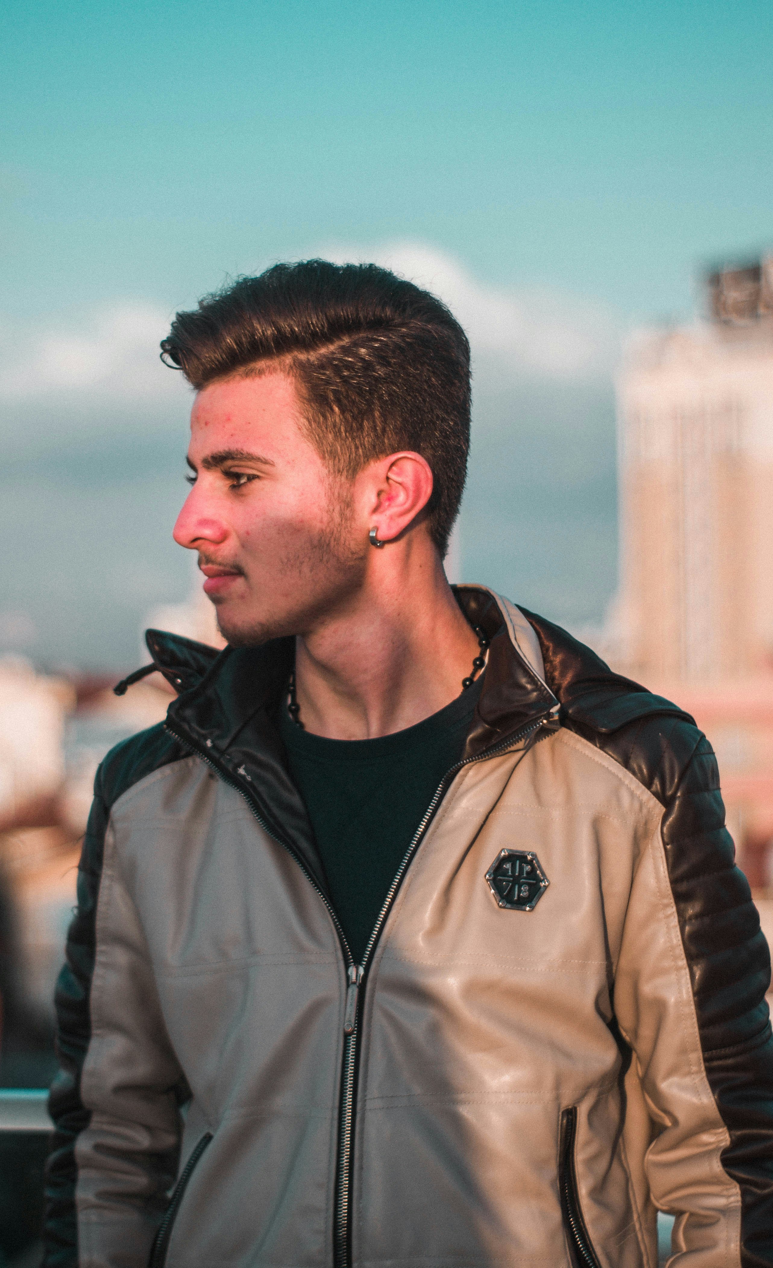 Man standing near building close-up photography photo – Free Man Image ...