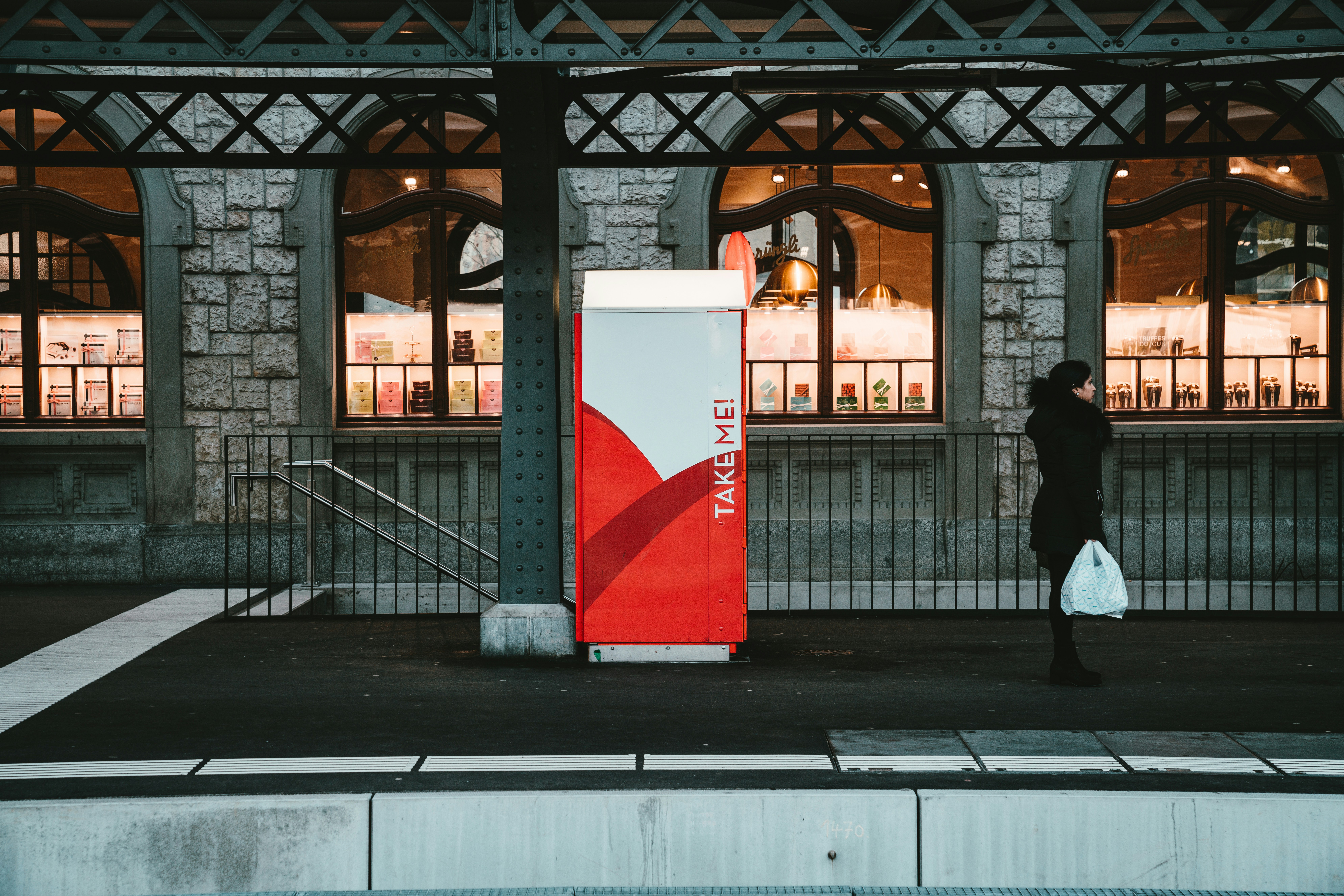 Person standing near buildings photo – Free Person Image on Unsplash