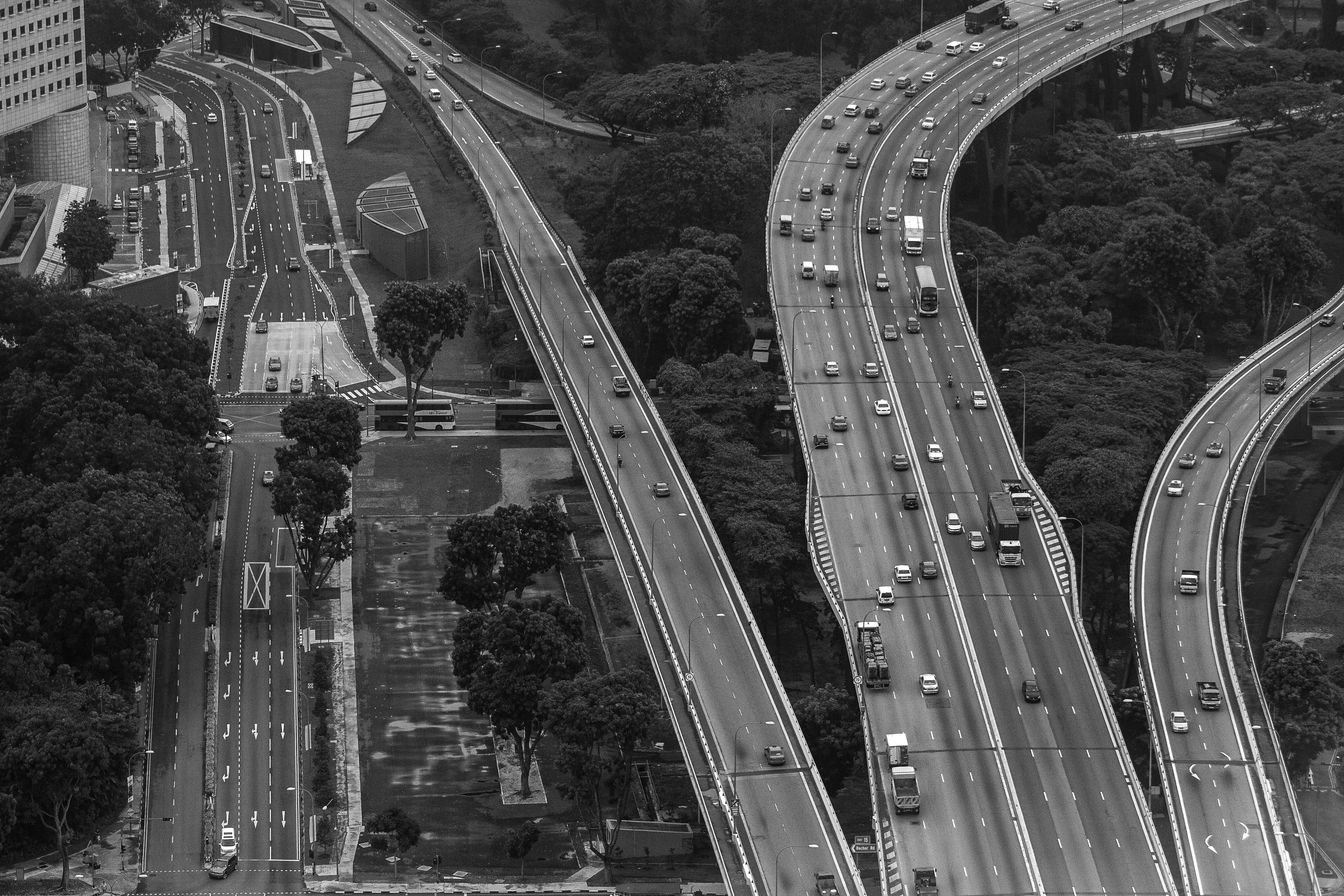 Grayscale photography of vehicles on pathway photo – Free Grey Image on ...