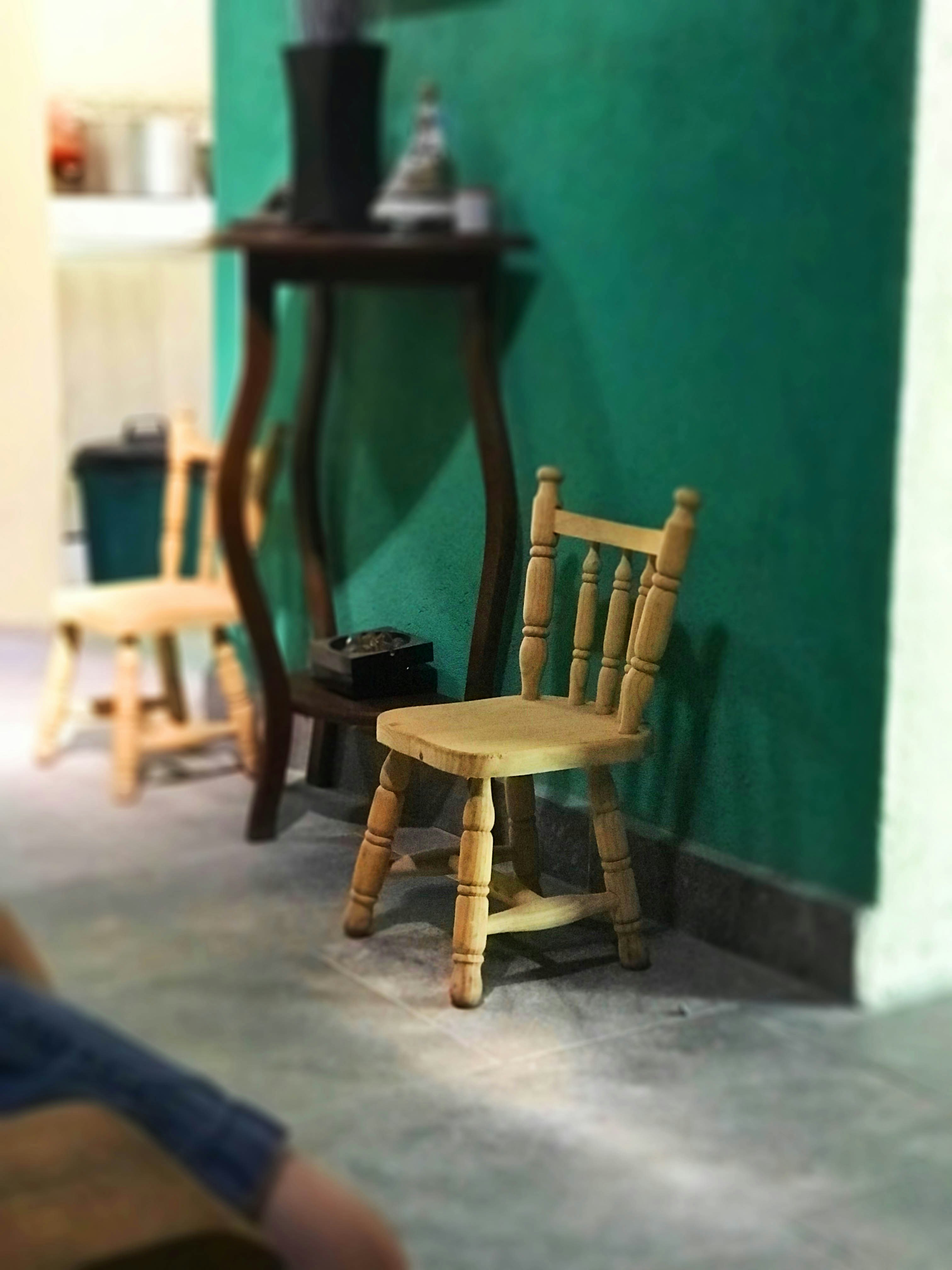 brown wooden chair beside brown wooden table