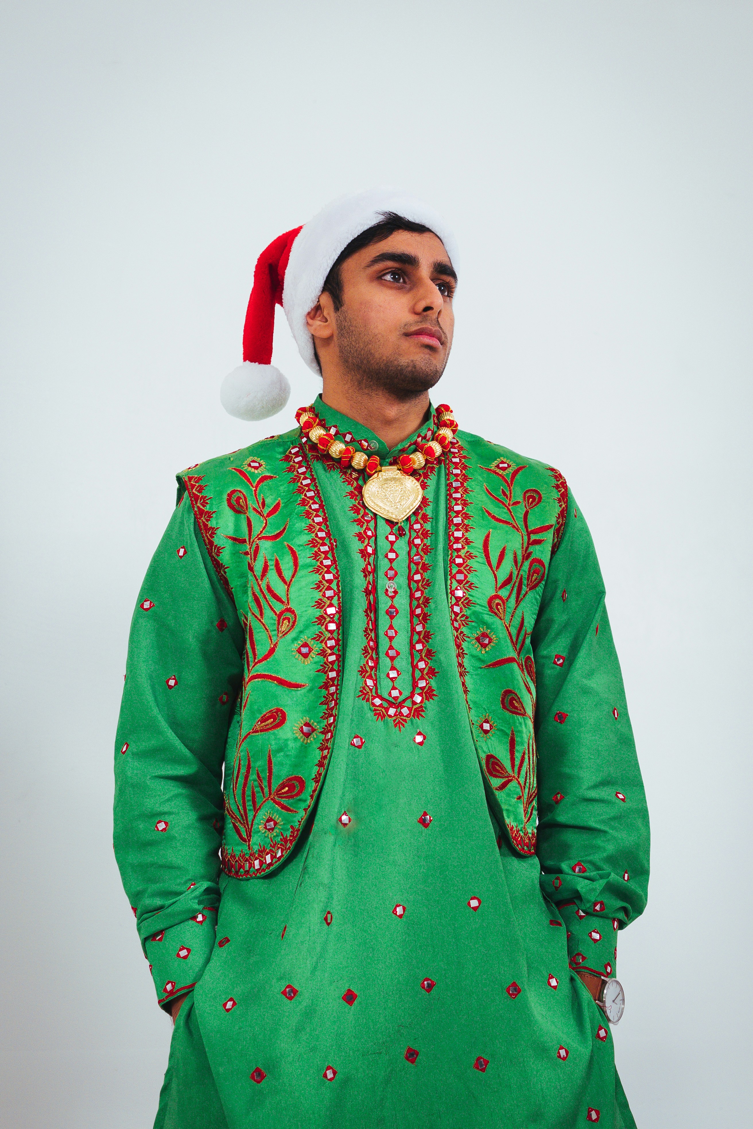 Emerald Attire, Santa Hat: A Portrait of Festive Craft and Quiet Confidence