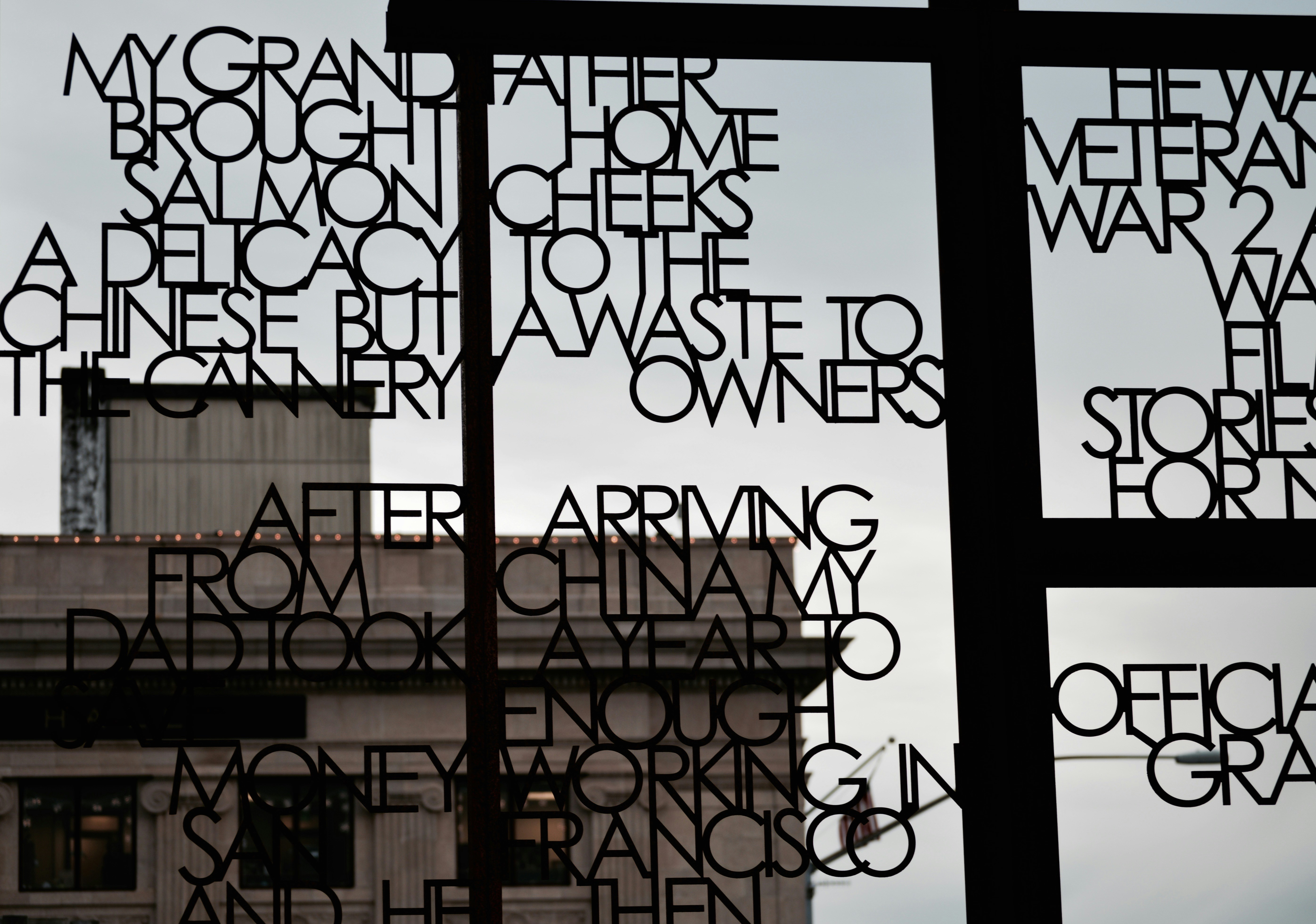 Letters in Glass: Framed Cityscape through a Cutout Mesh