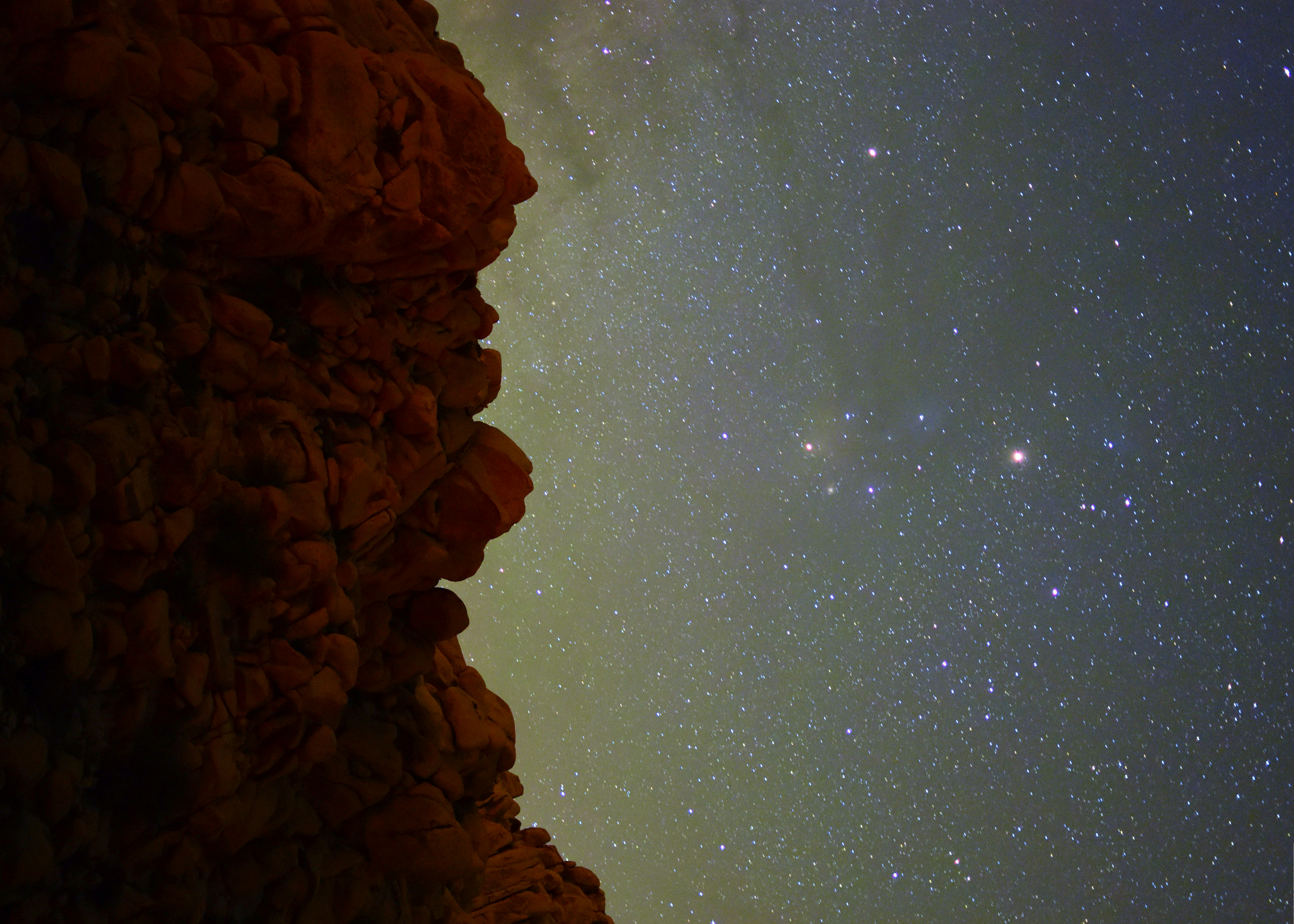 rock formation under sky with stars photo – Free Nature Image on Unsplash