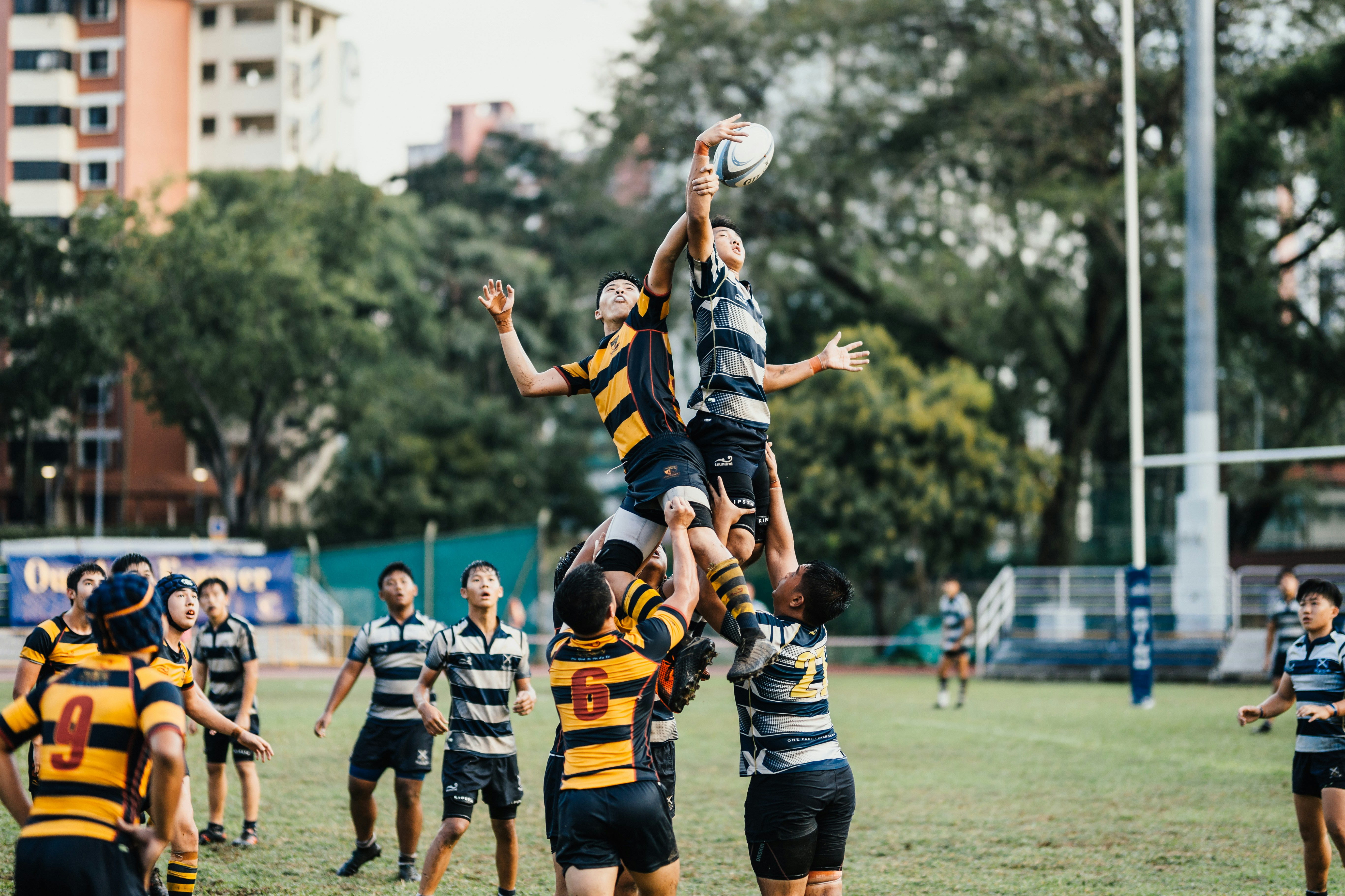 Group of men playing sports photo – Free Human Image on Unsplash