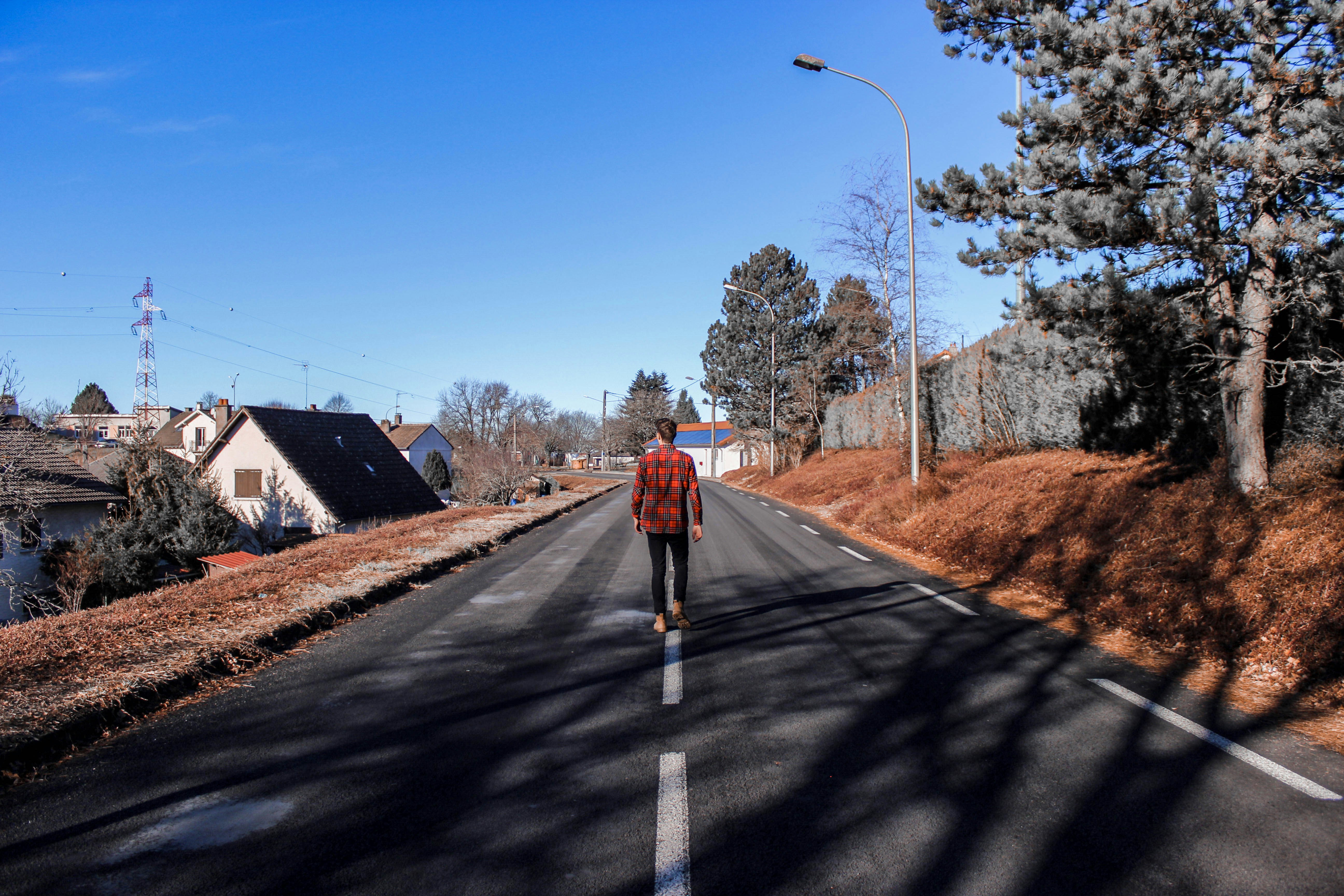 Pedestrian in a Quiet Suburban Lane