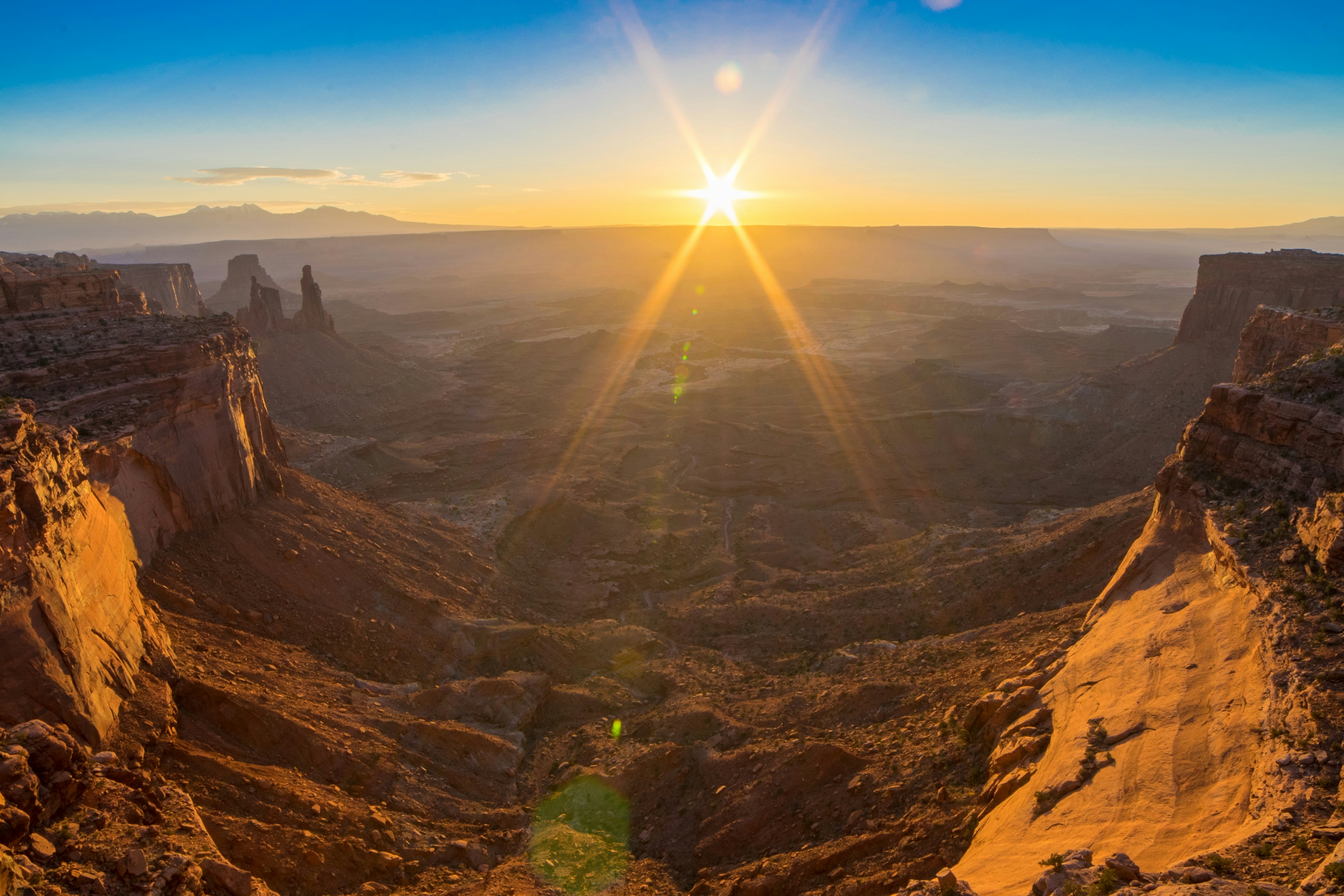 Dawn Starburst Over the Grand Canyon Rim