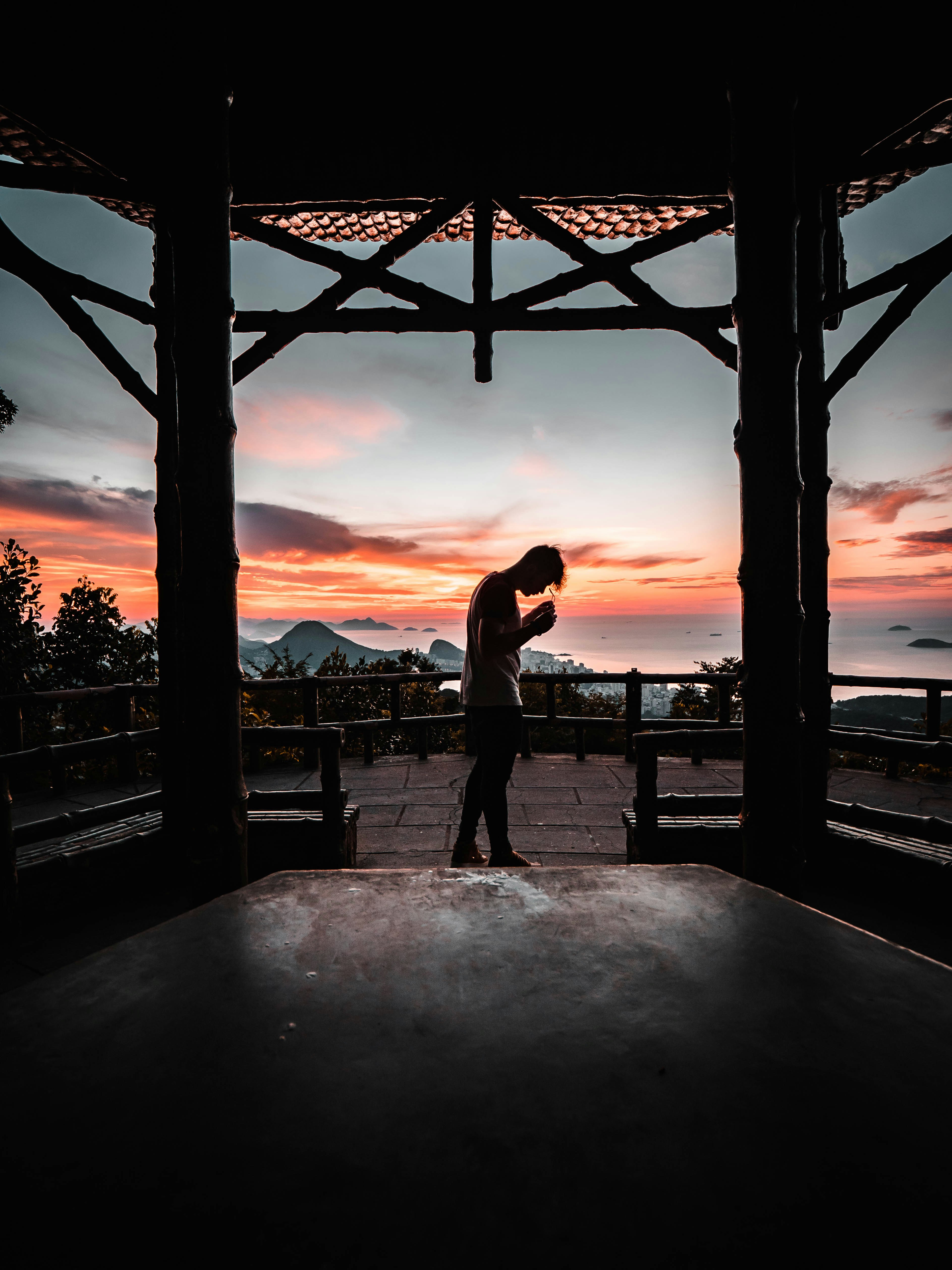 Person standing near concrete cottage during golden hour photo – Free ...